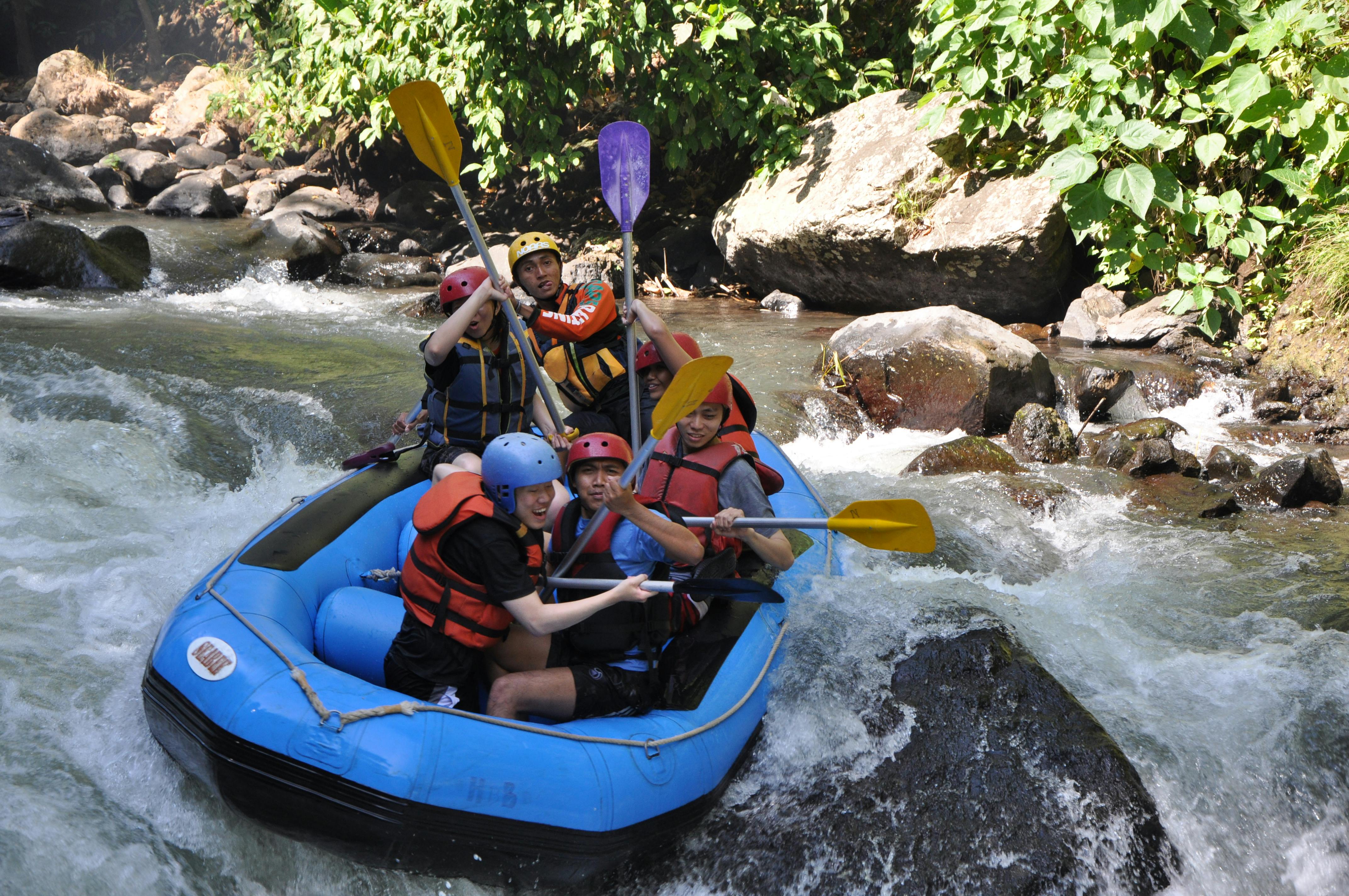 People Riding on Inflatable Raft · Free Stock Photo