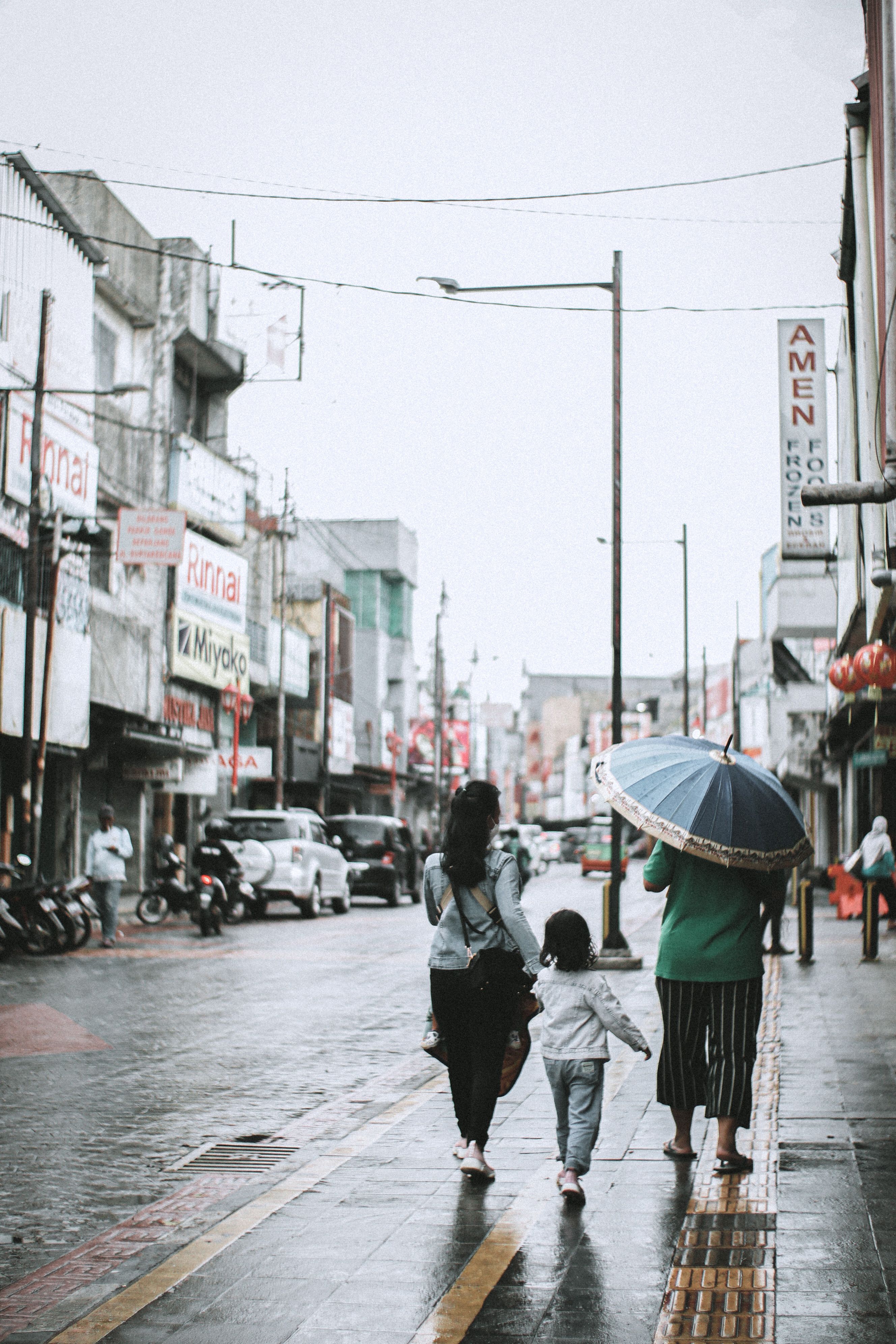 Time-lapse Photo of Person walking on Sidewalk · Free Stock Photo