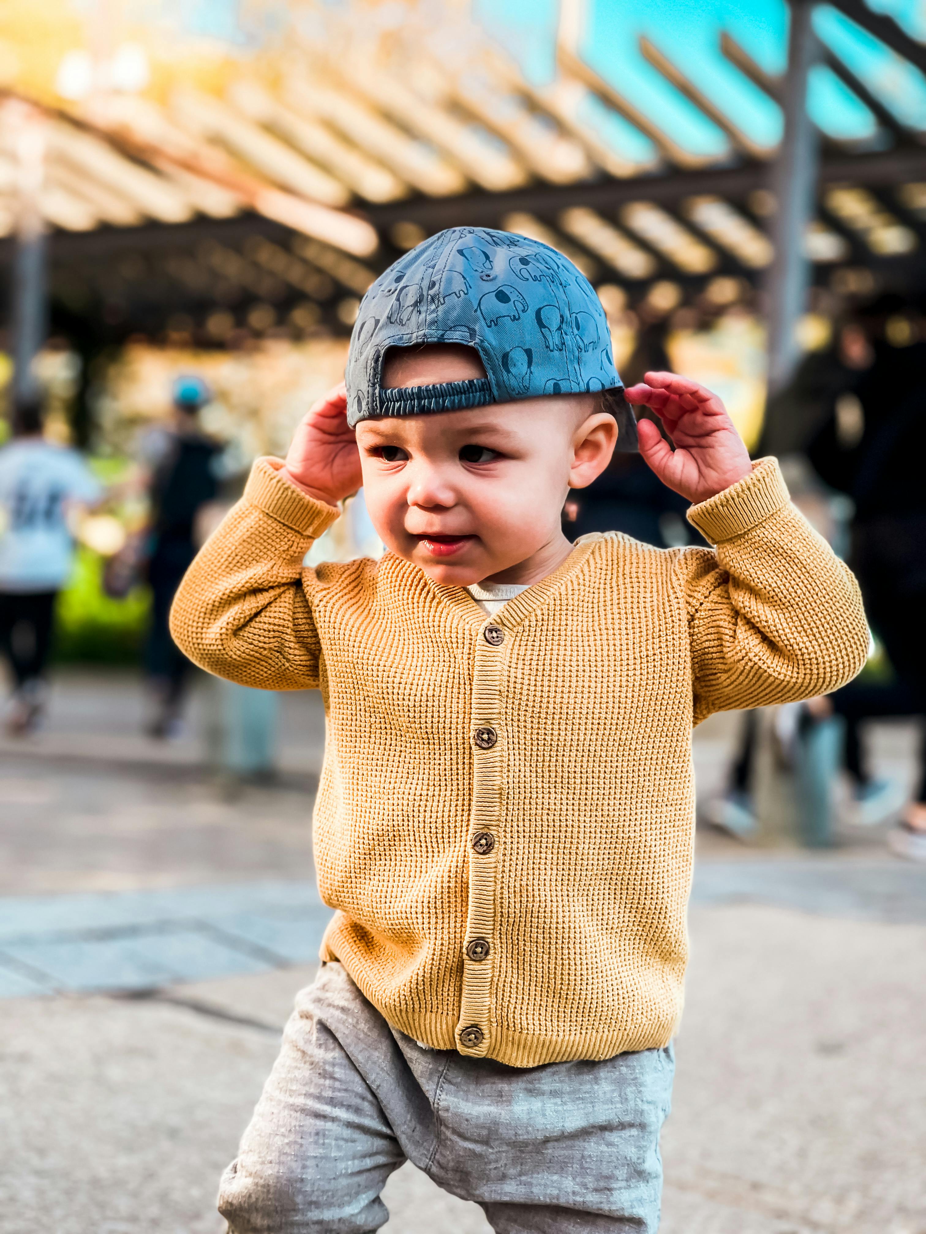 A Boy Wearing a Cap · Free Stock Photo