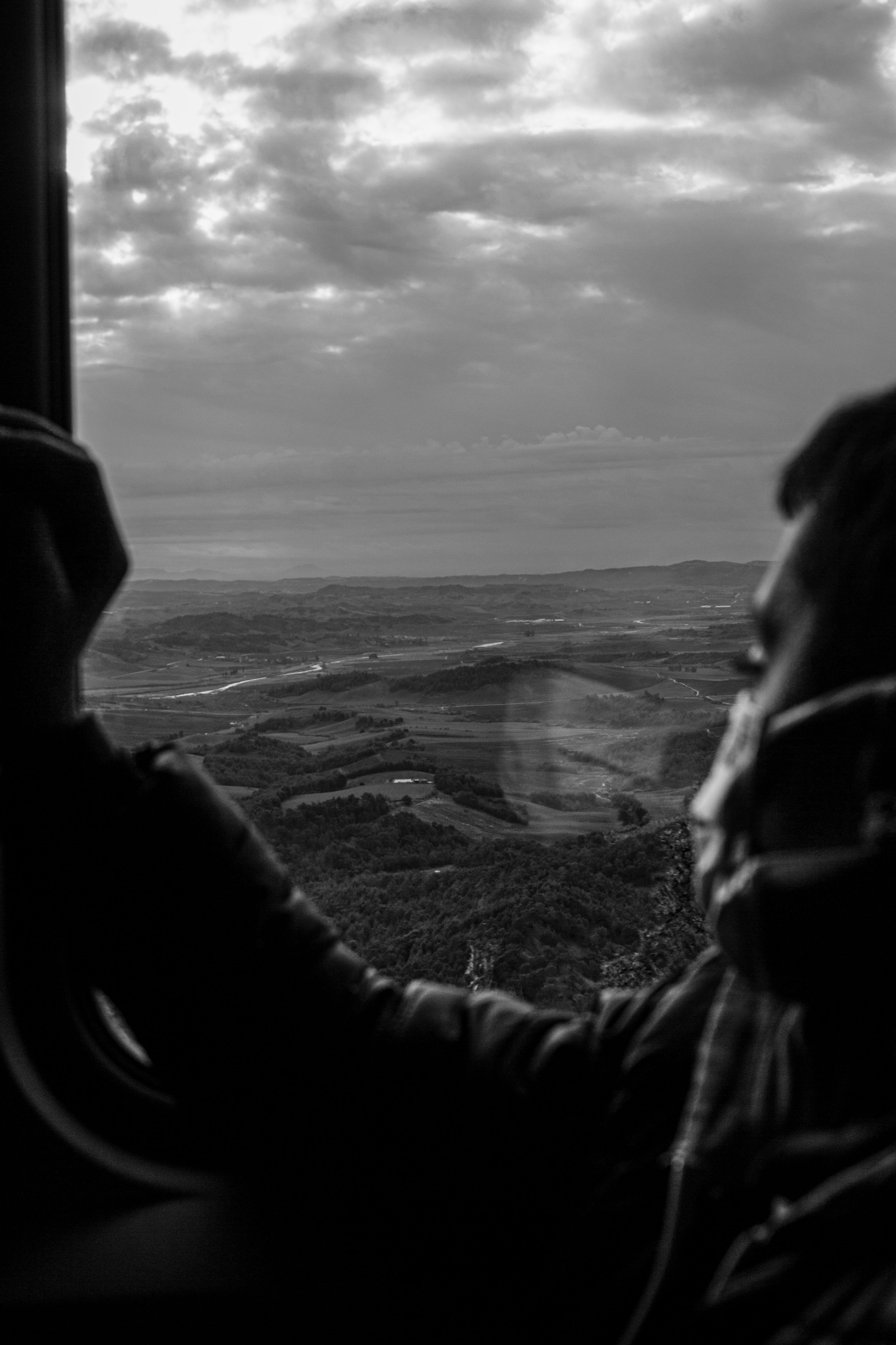 Man Looking Out the Window on the Landscape · Free Stock Photo