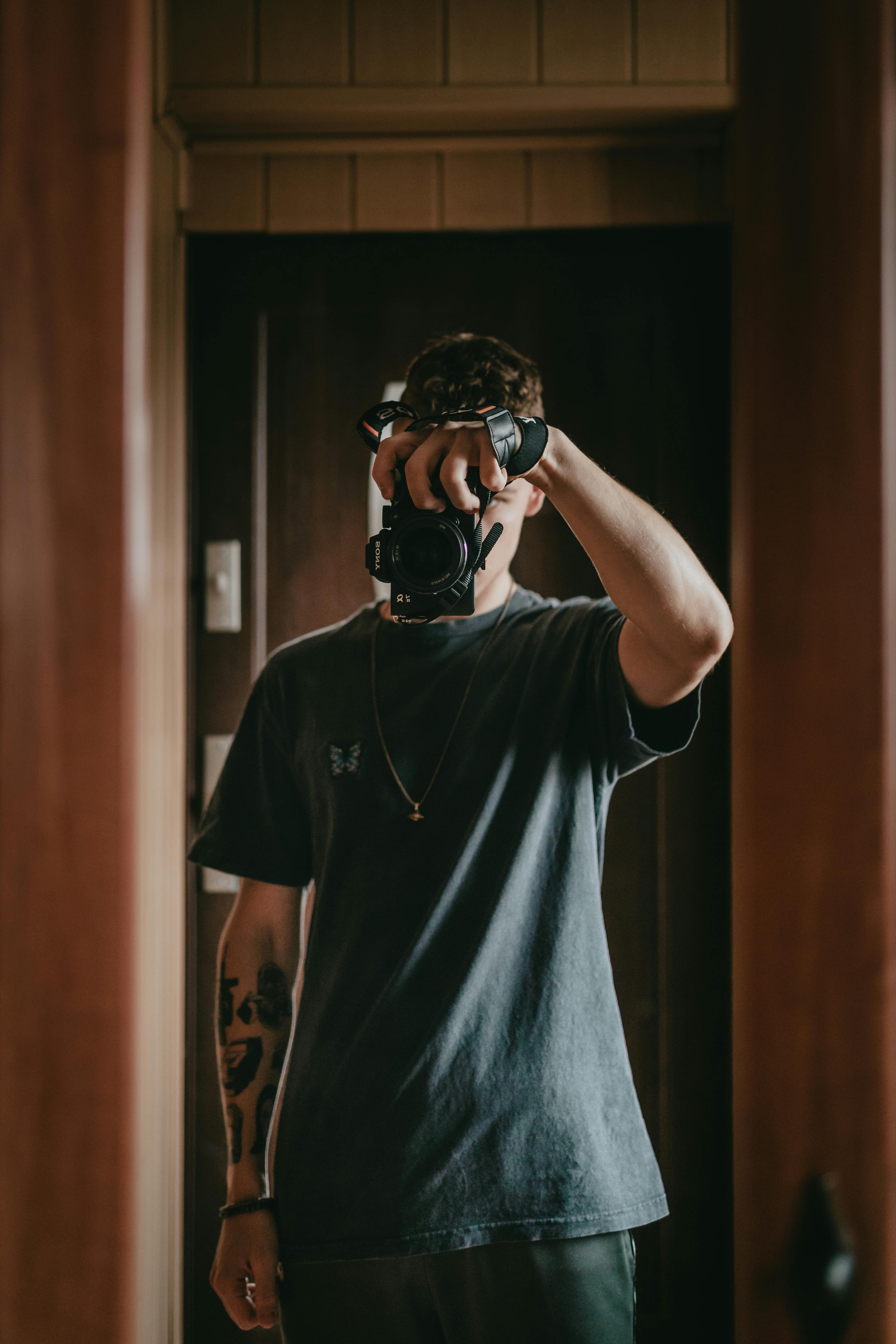 A Man Using Camera · Free Stock Photo