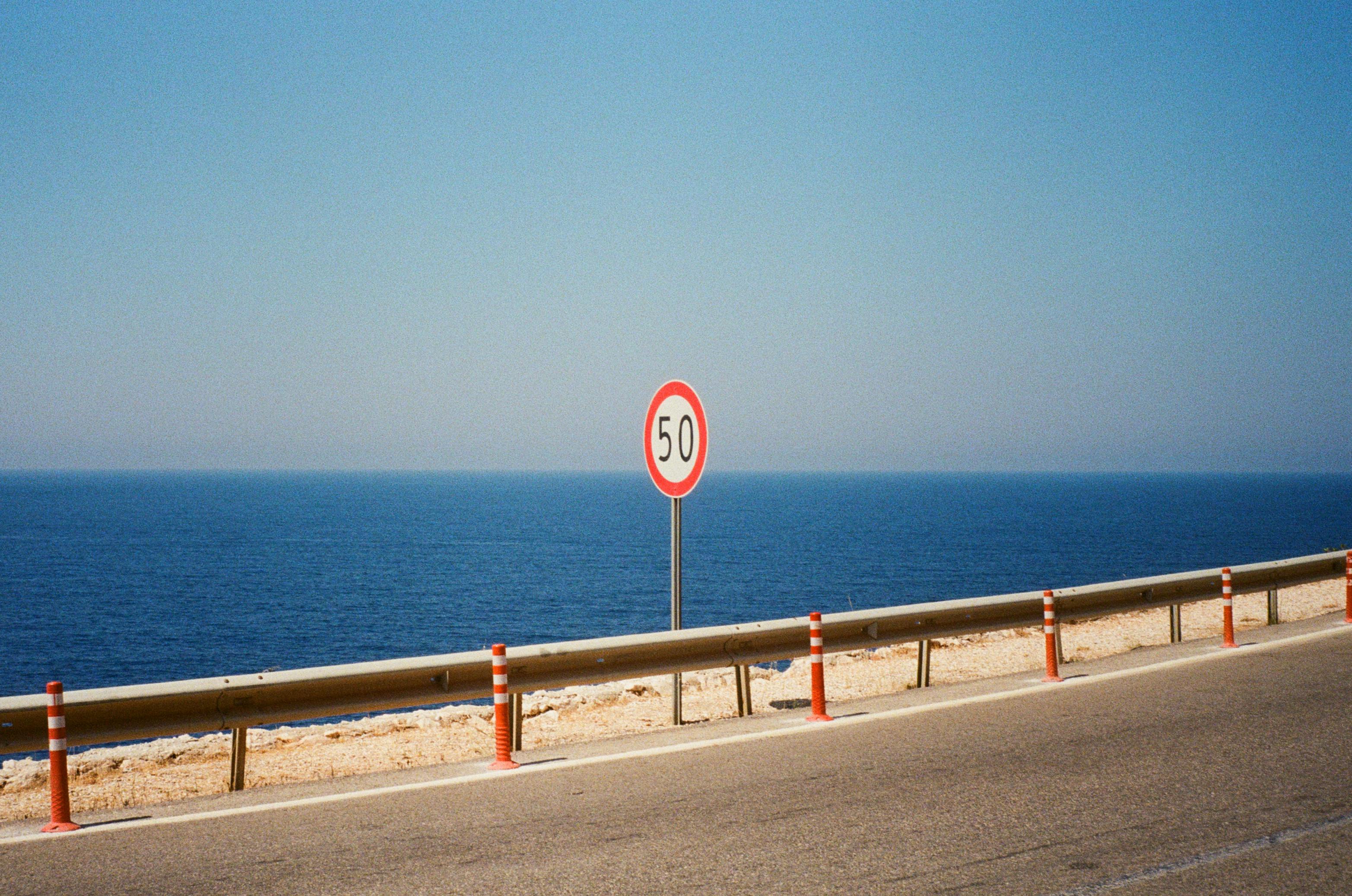 Grey Concrete Road in the Middle of the Sea · Free Stock Photo