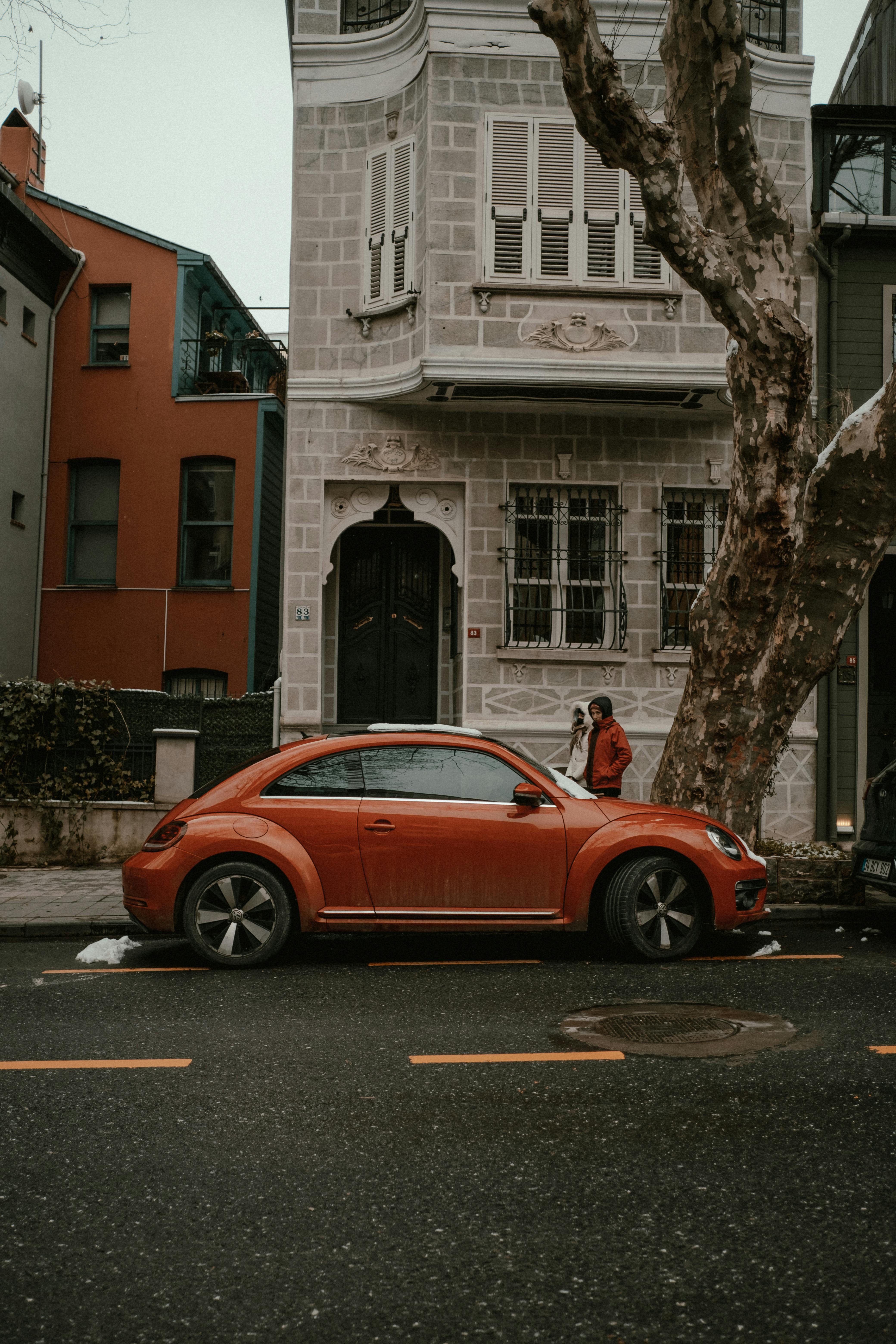 Car on the Side of the Street in City and Buildings · Free Stock Photo