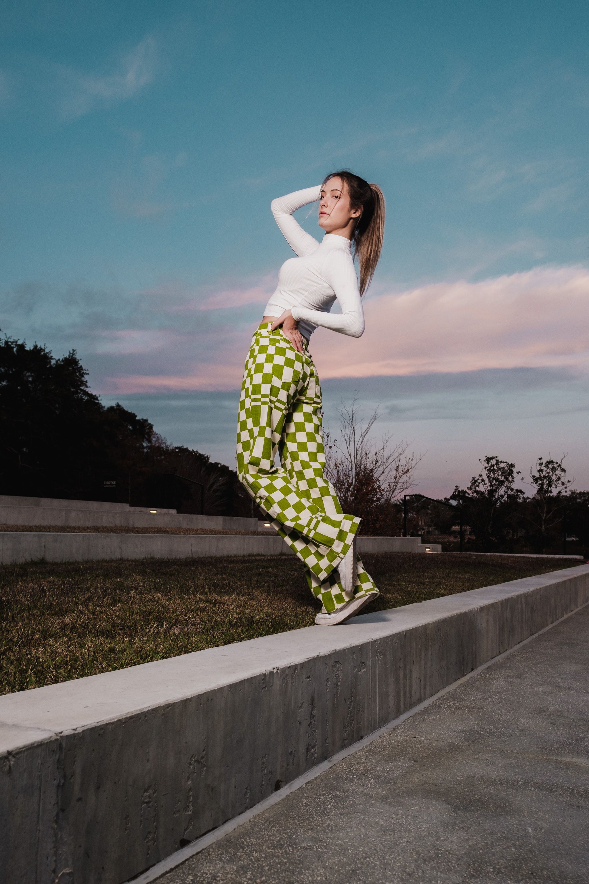 Woman Posing by Wall · Free Stock Photo