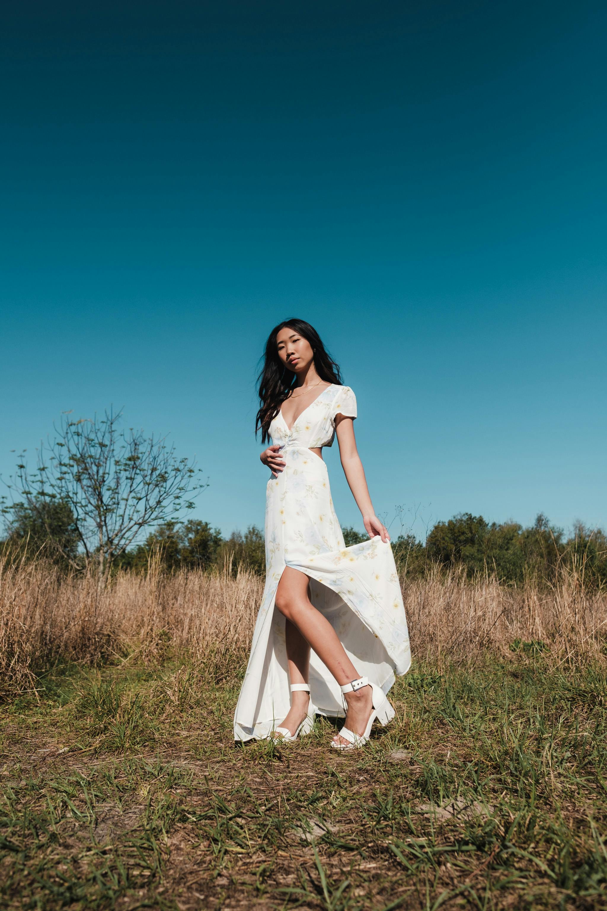 Elegant Woman in White Dress · Free Stock Photo