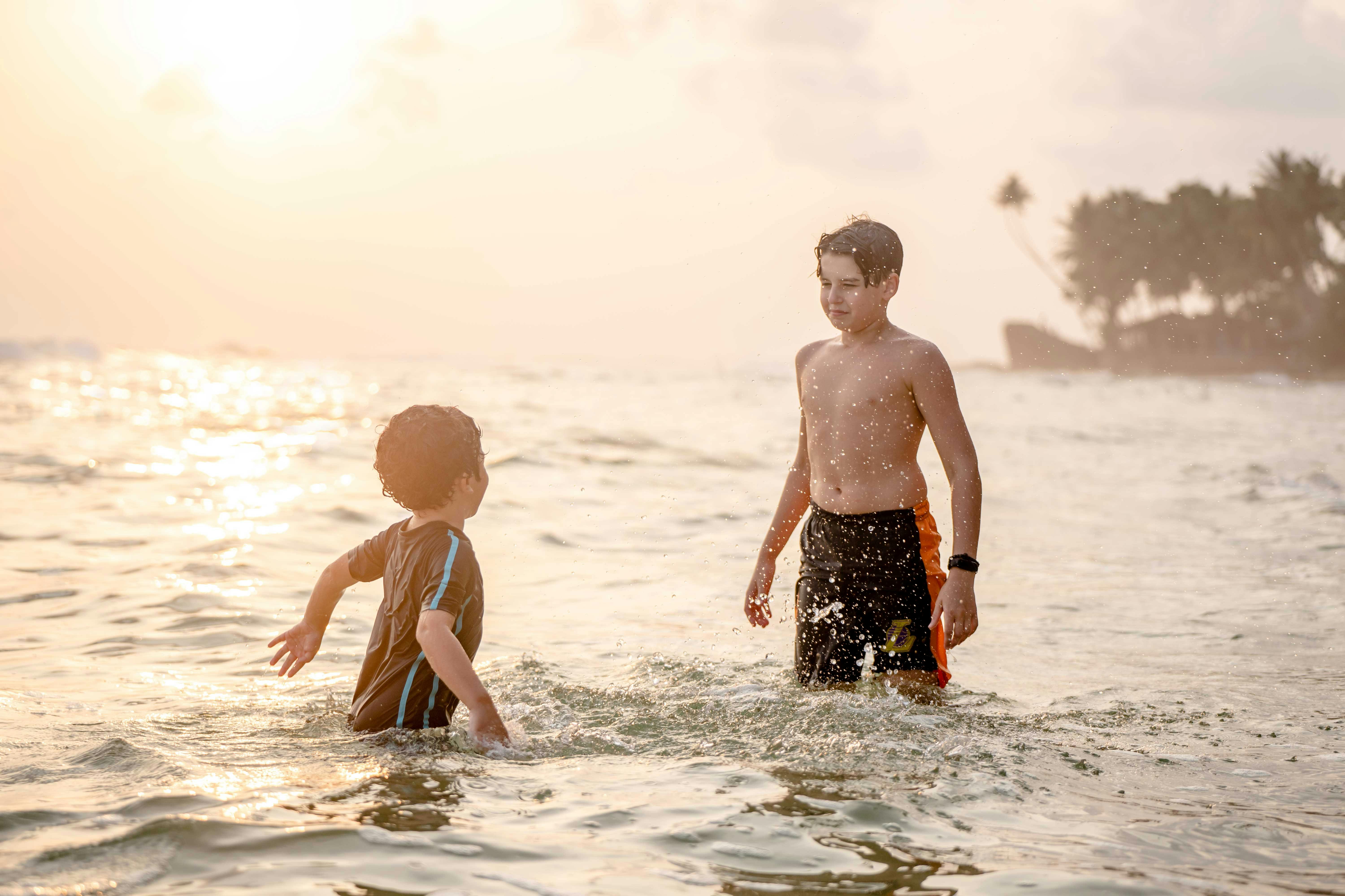 Photo of Boys swimming in the Ocean · Free Stock Photo