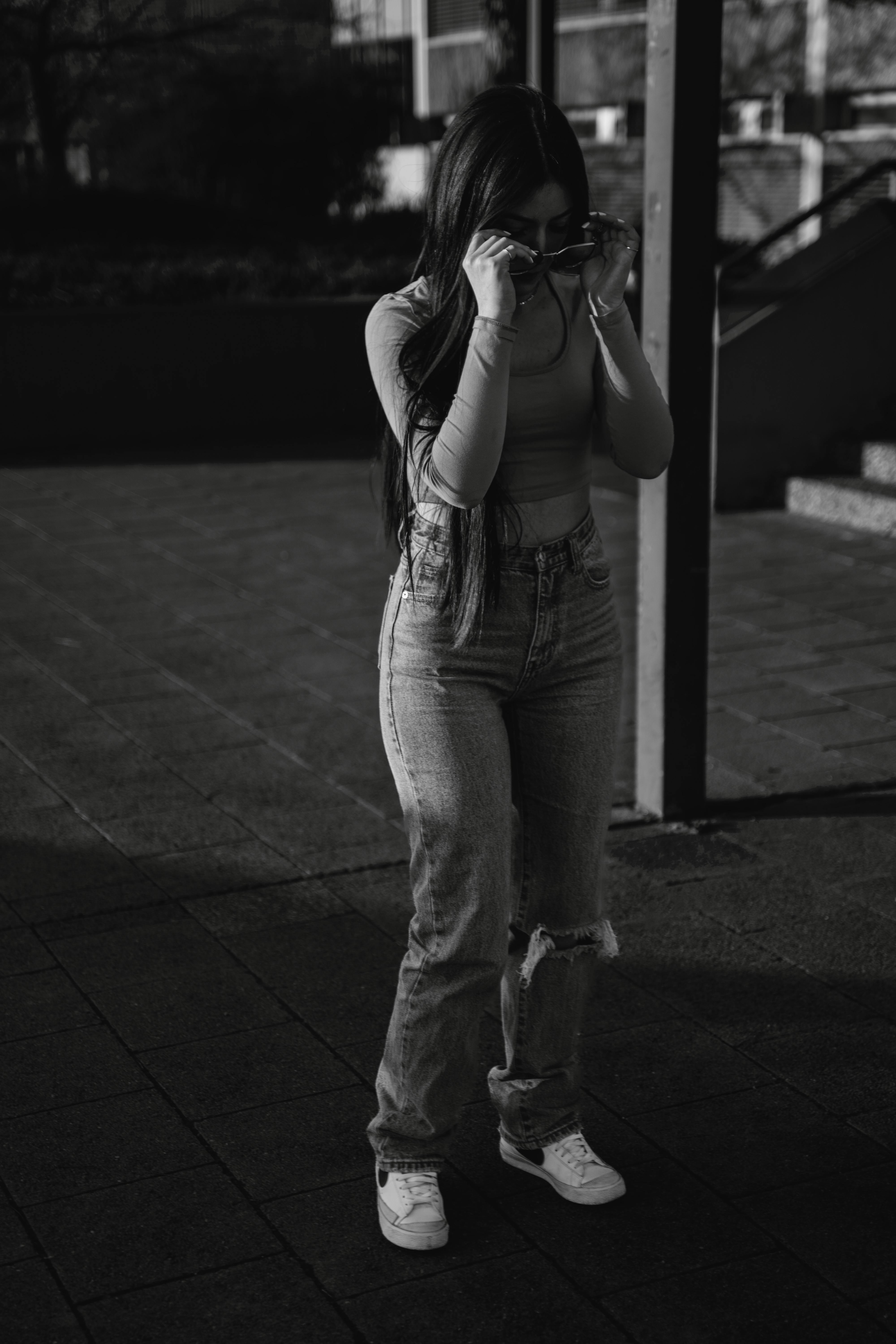 Grayscale Photo of a Man Walking with Hand inside Pocket · Free Stock Photo