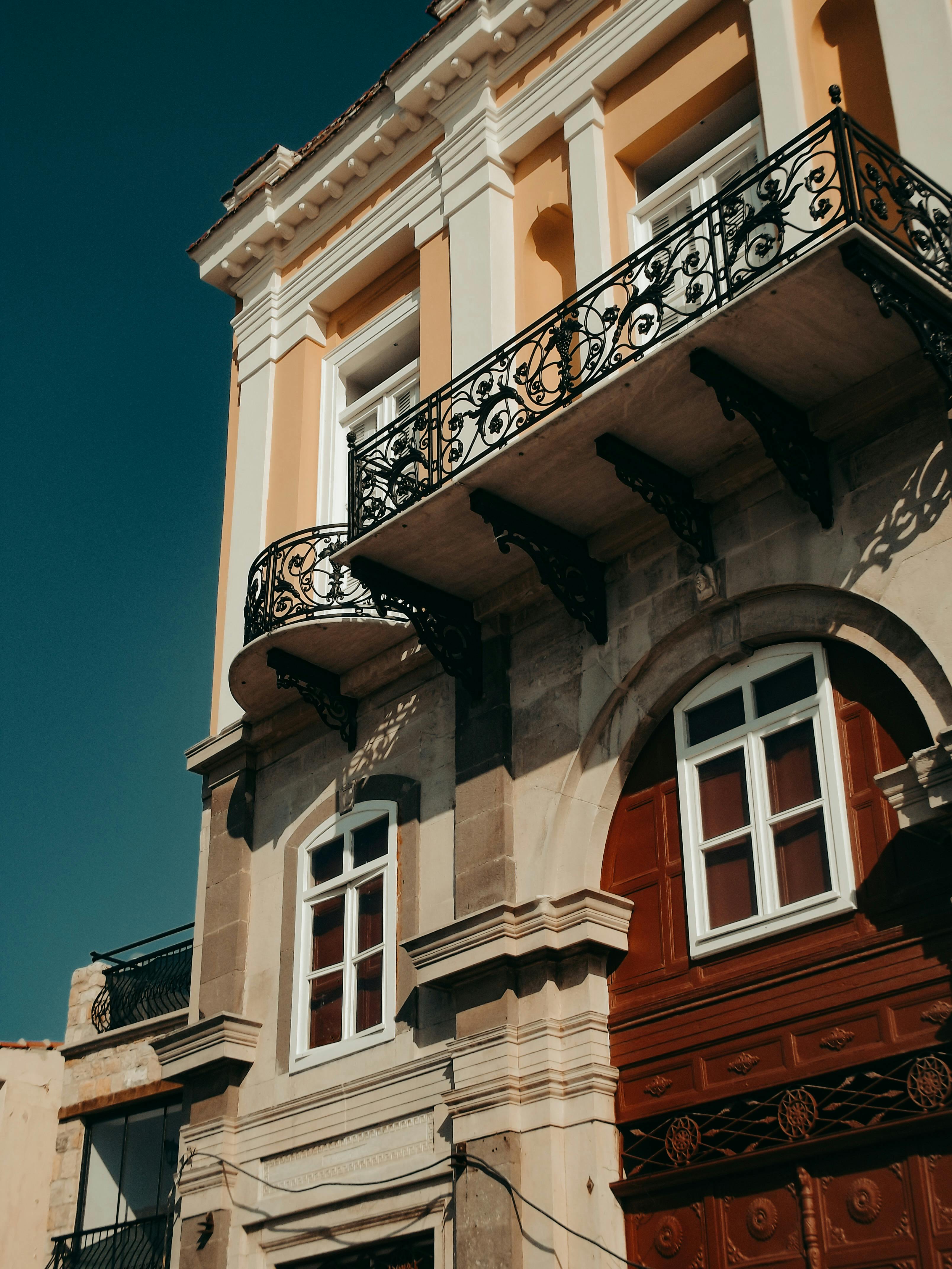 Ornamented Building with Balcony · Free Stock Photo
