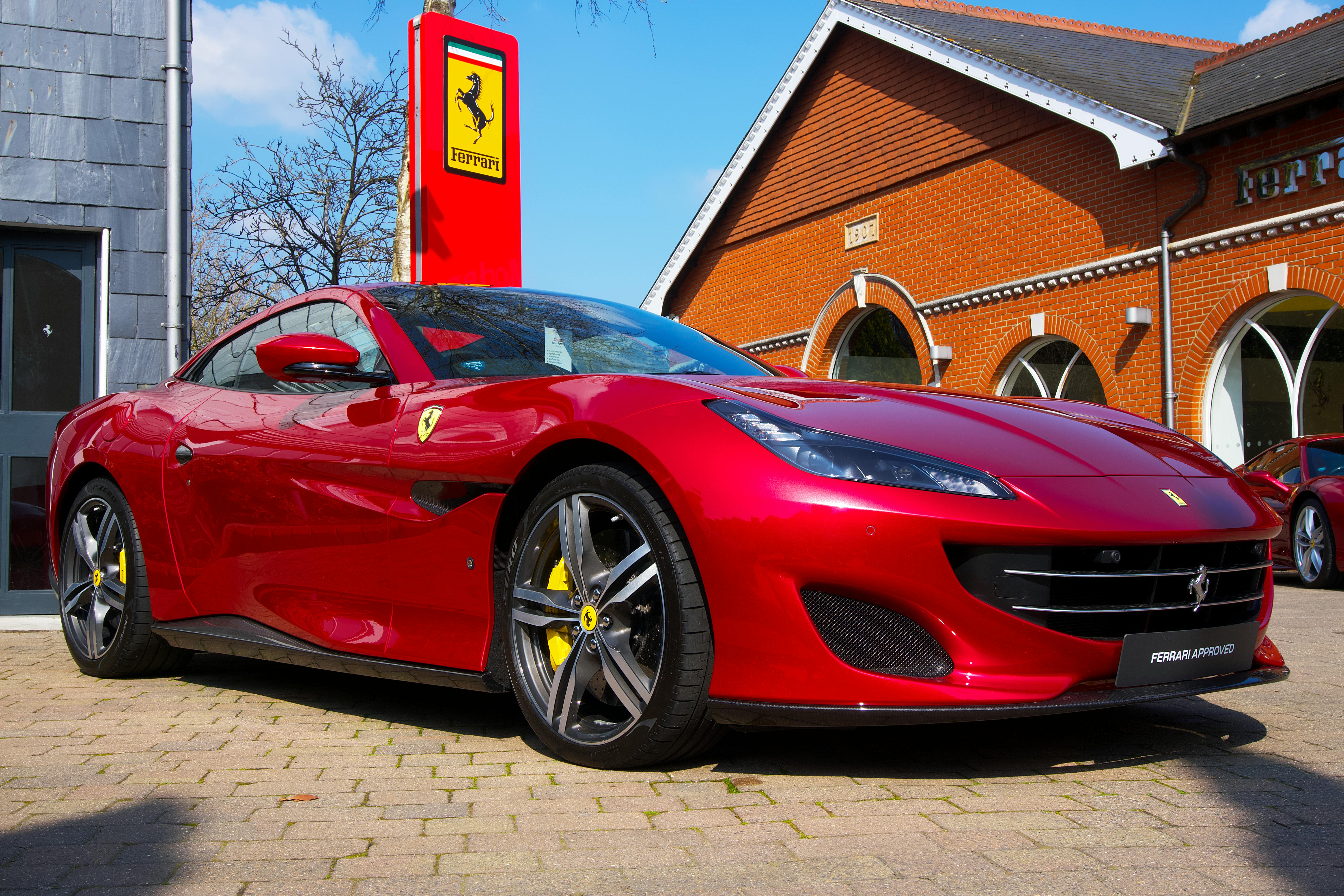 Close-Up Photo of a Red Ferrari Car · Free Stock Photo