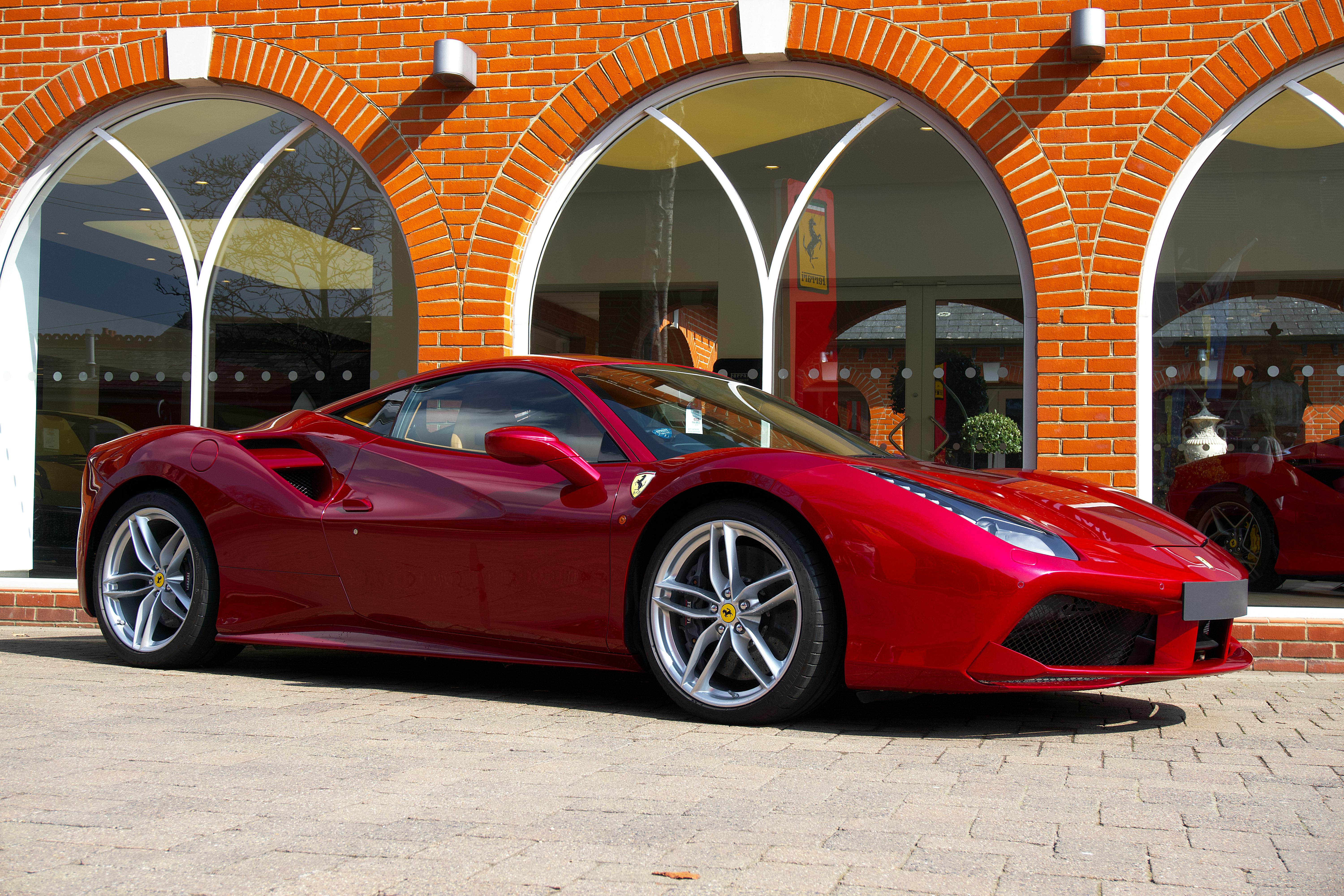 Parked Red Ferrari · Free Stock Photo
