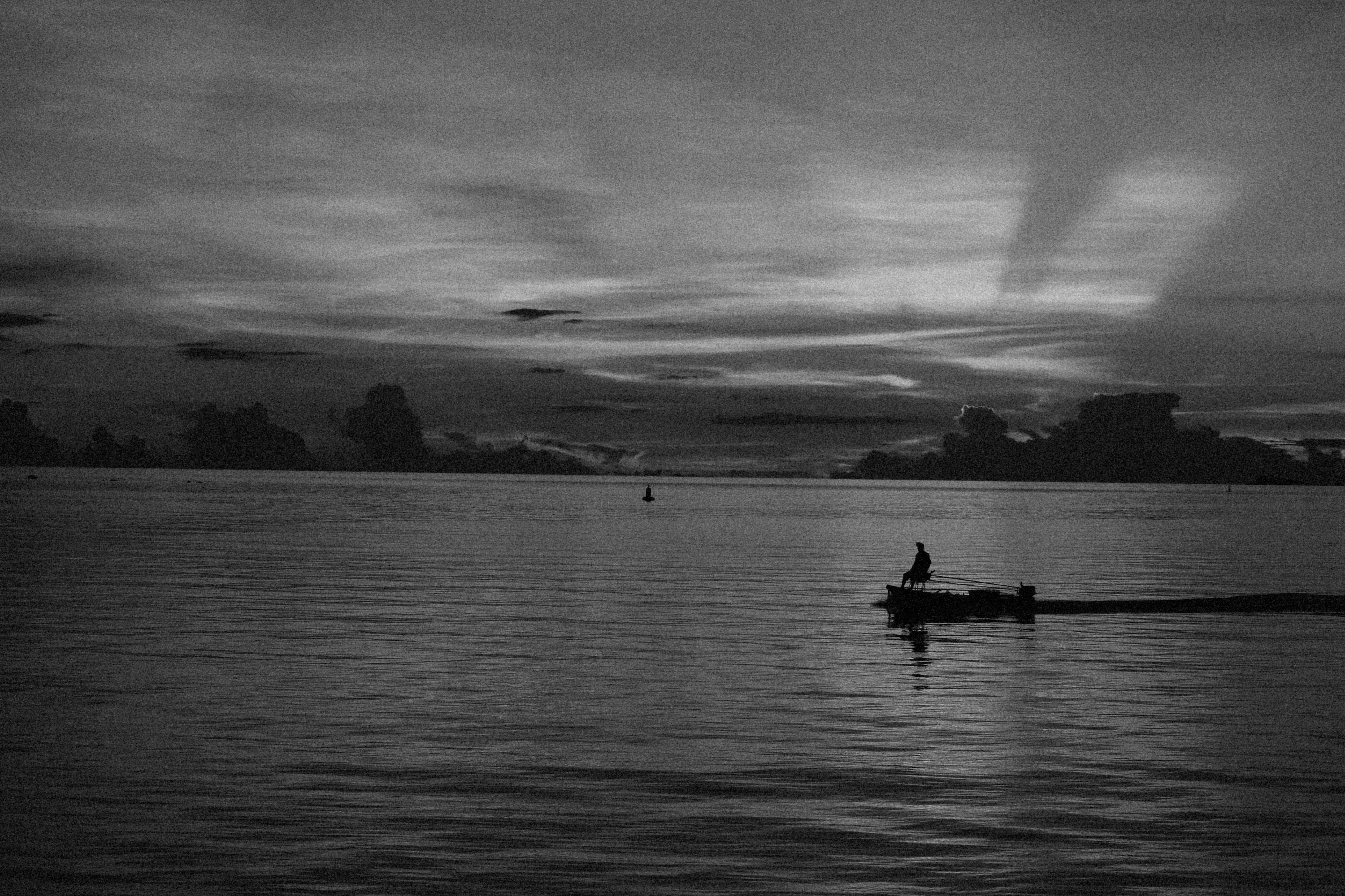 Grayscale Photography of a Boat Near the Lake · Free Stock Photo