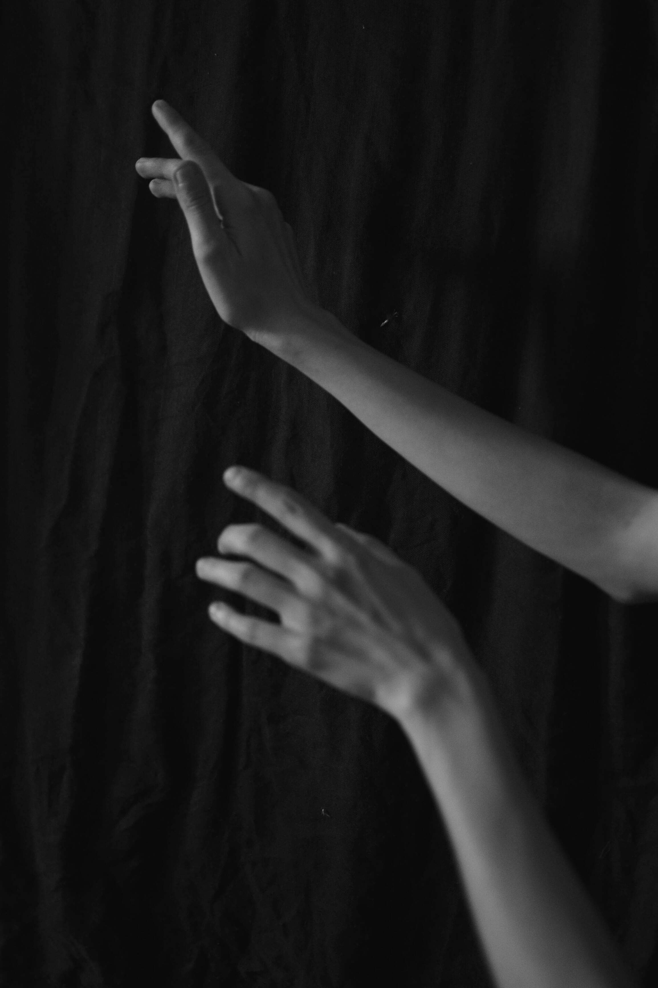 Grayscale Photo of Arms · Free Stock Photo