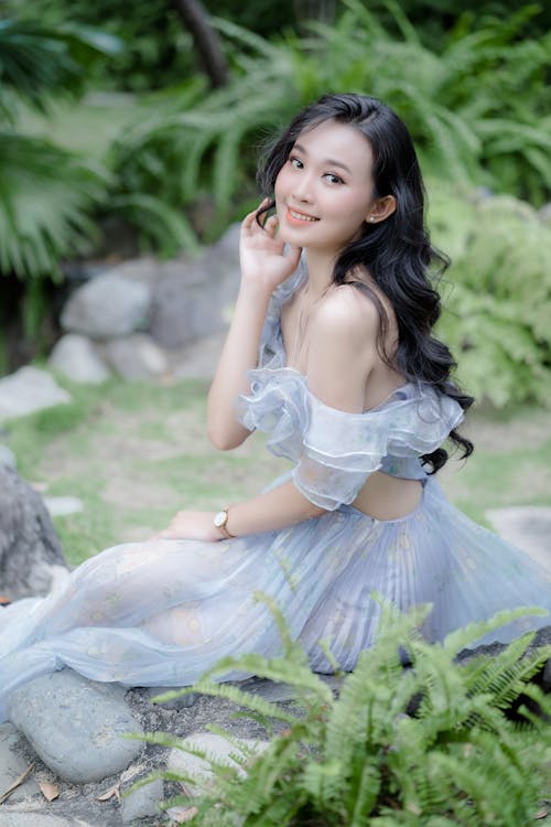 Woman In Blue Off Shoulder Dress Standing Beside The Railings · Free
