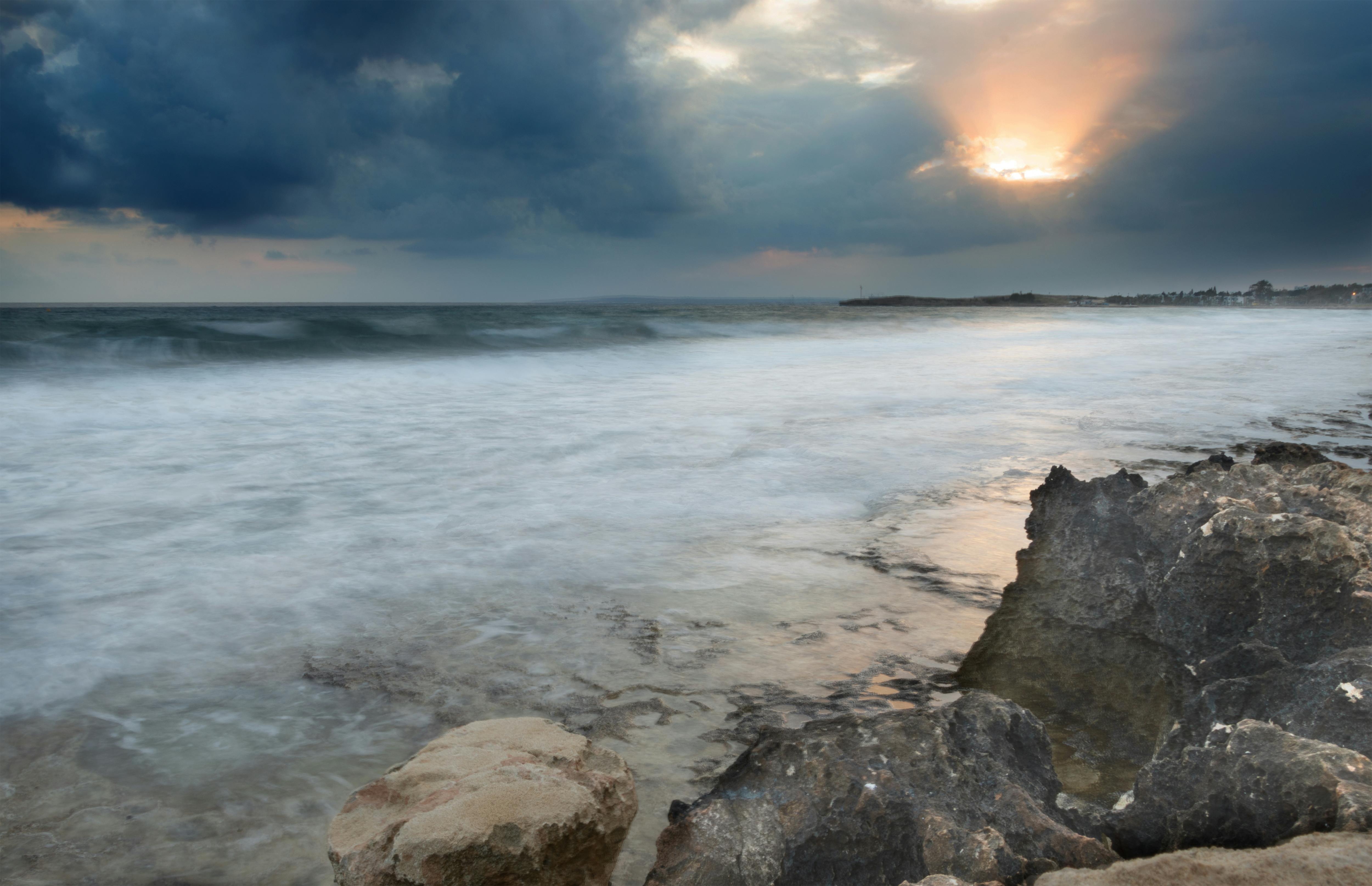 Scenic View of Ocean During Dawn · Free Stock Photo