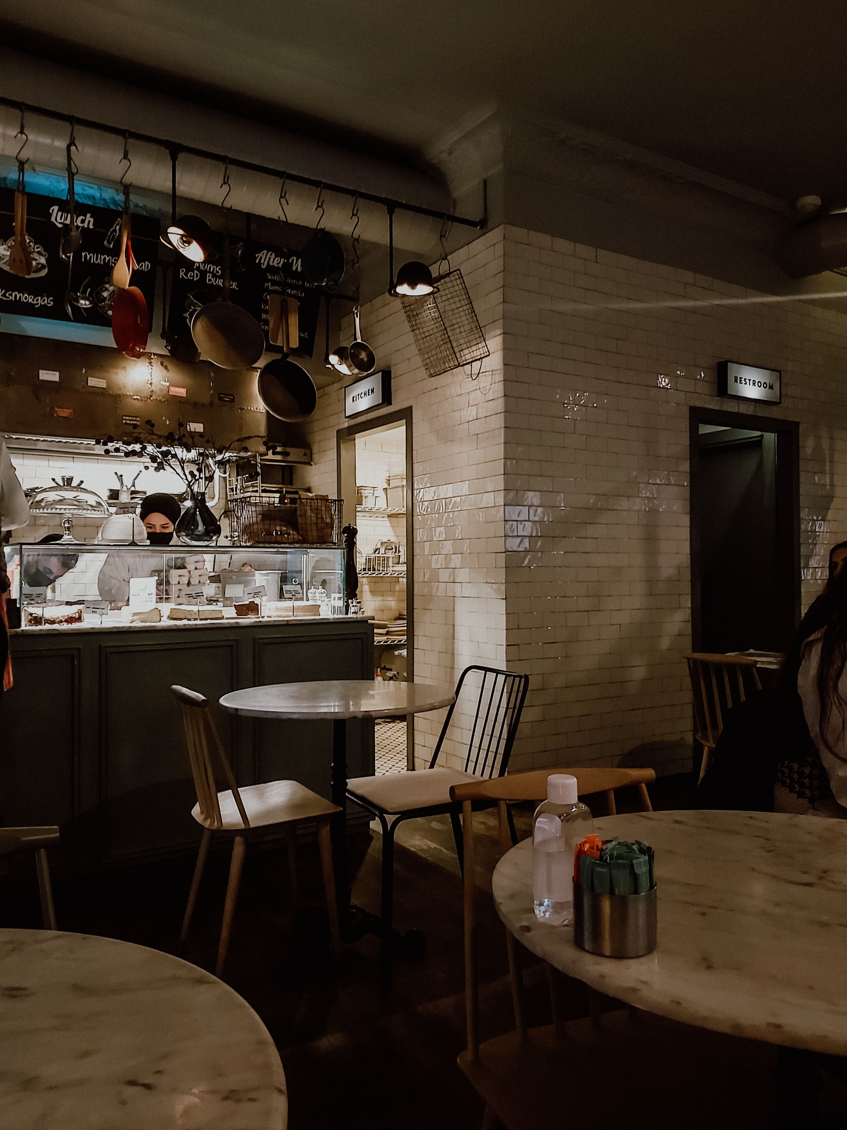 Woman Behind Restaurant Counter · Free Stock Photo