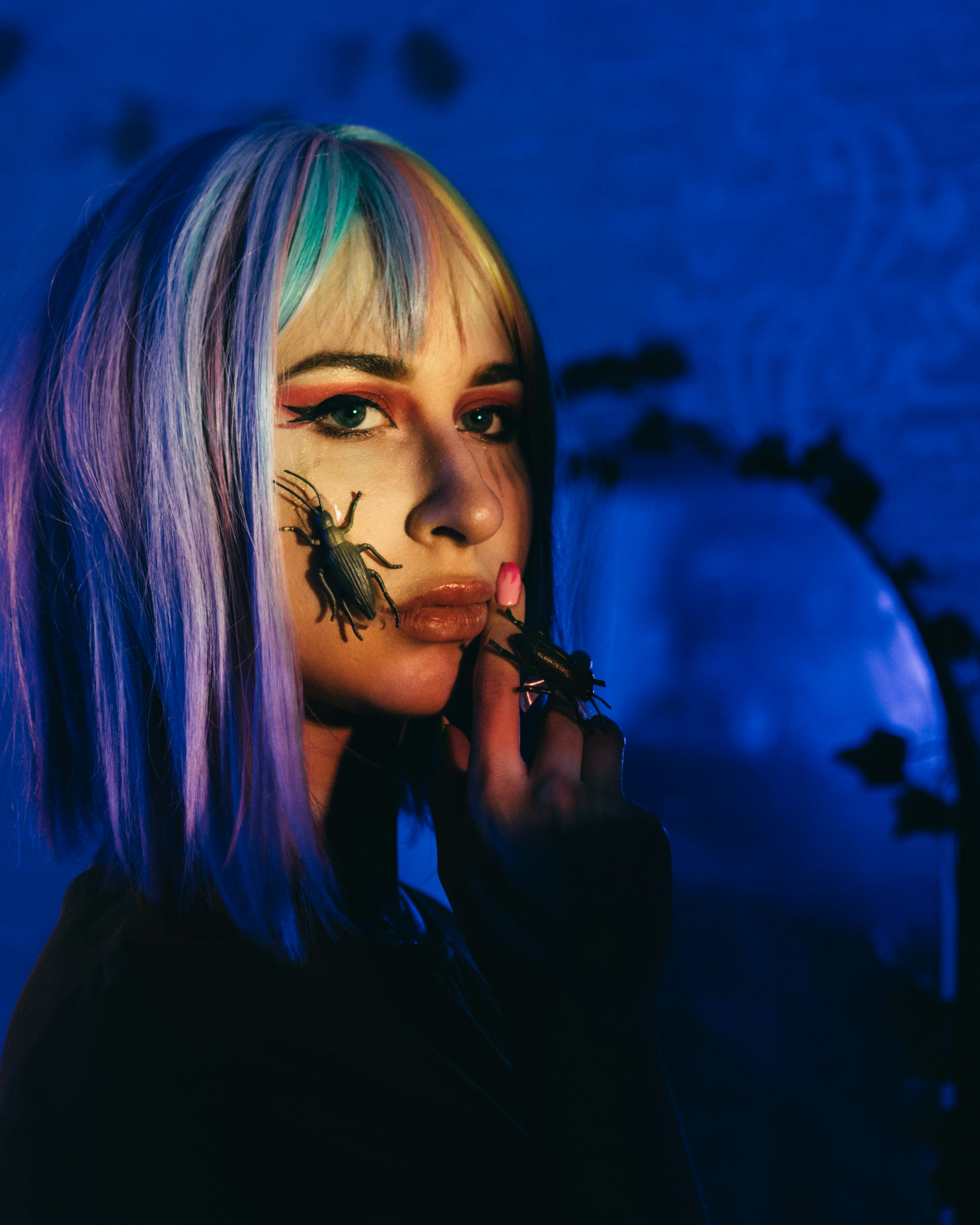 A Woman Posing with Insects · Free Stock Photo