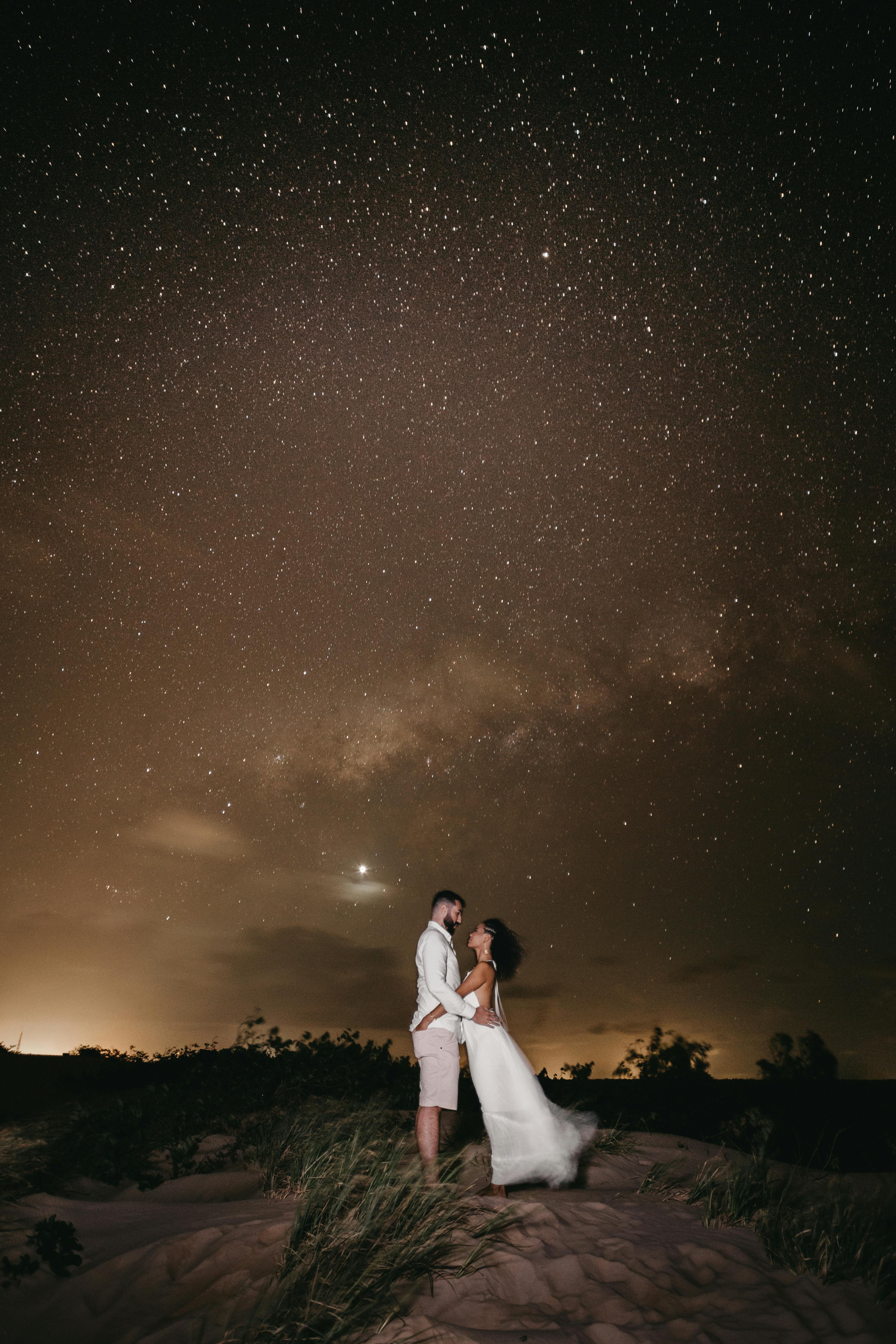 Couple Under Starry Night · Free Stock Photo