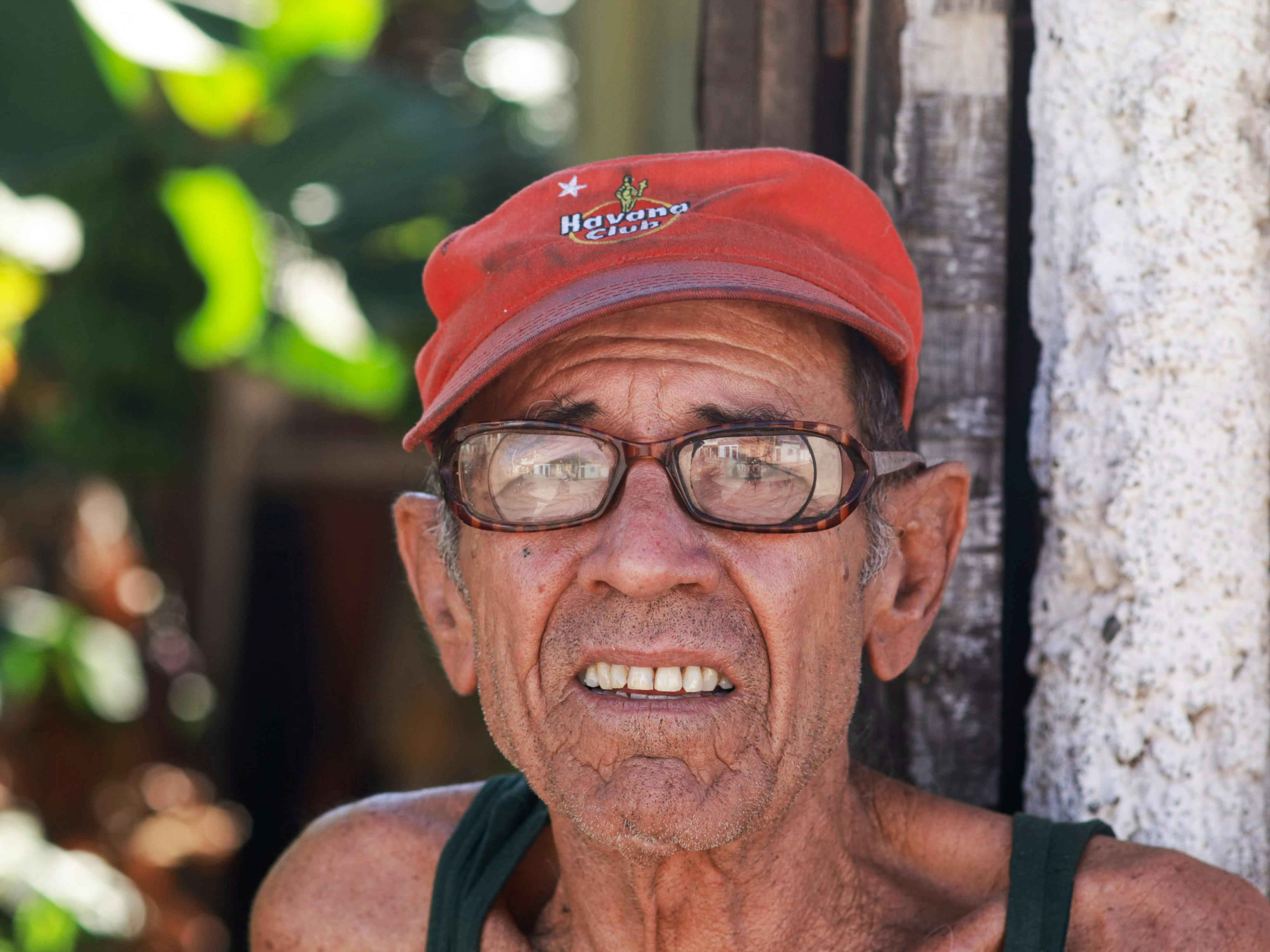 Photography of Man Showing Tattoo and Gold Teeth · Free Stock Photo