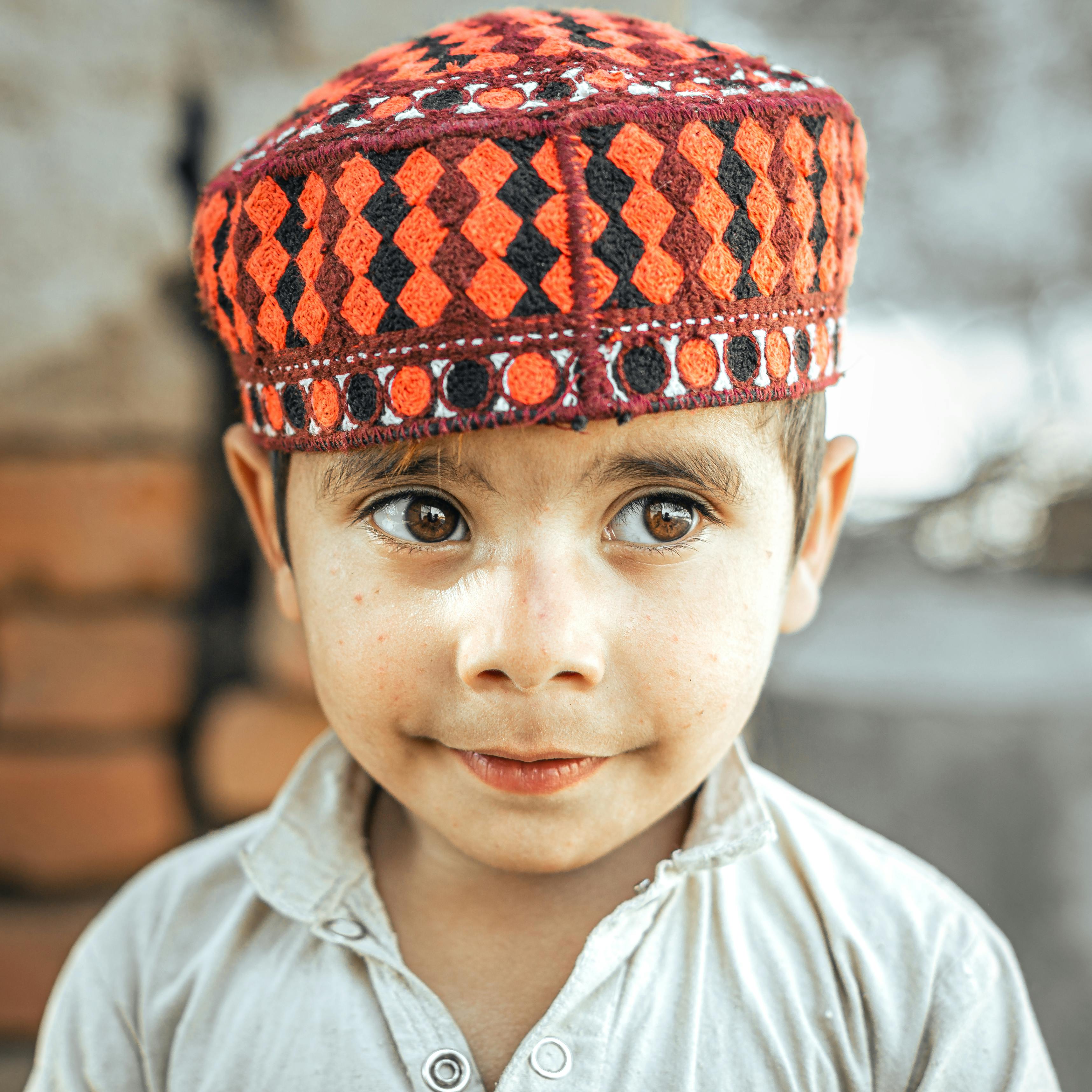 Boy in Traditional Clothes Standing Looking Afar · Free Stock Photo