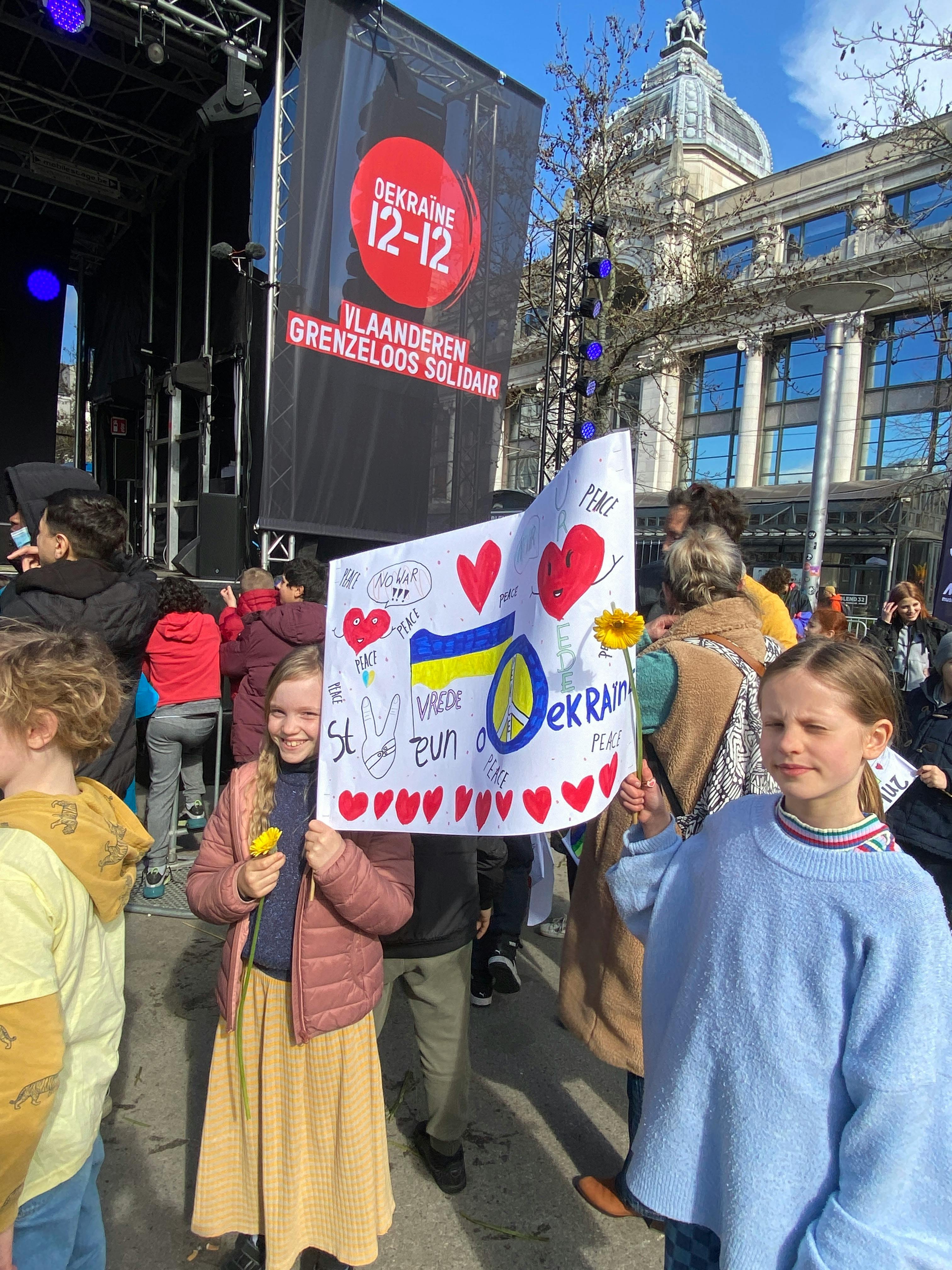 Children with a Protest Sign in a Town · Free Stock Photo