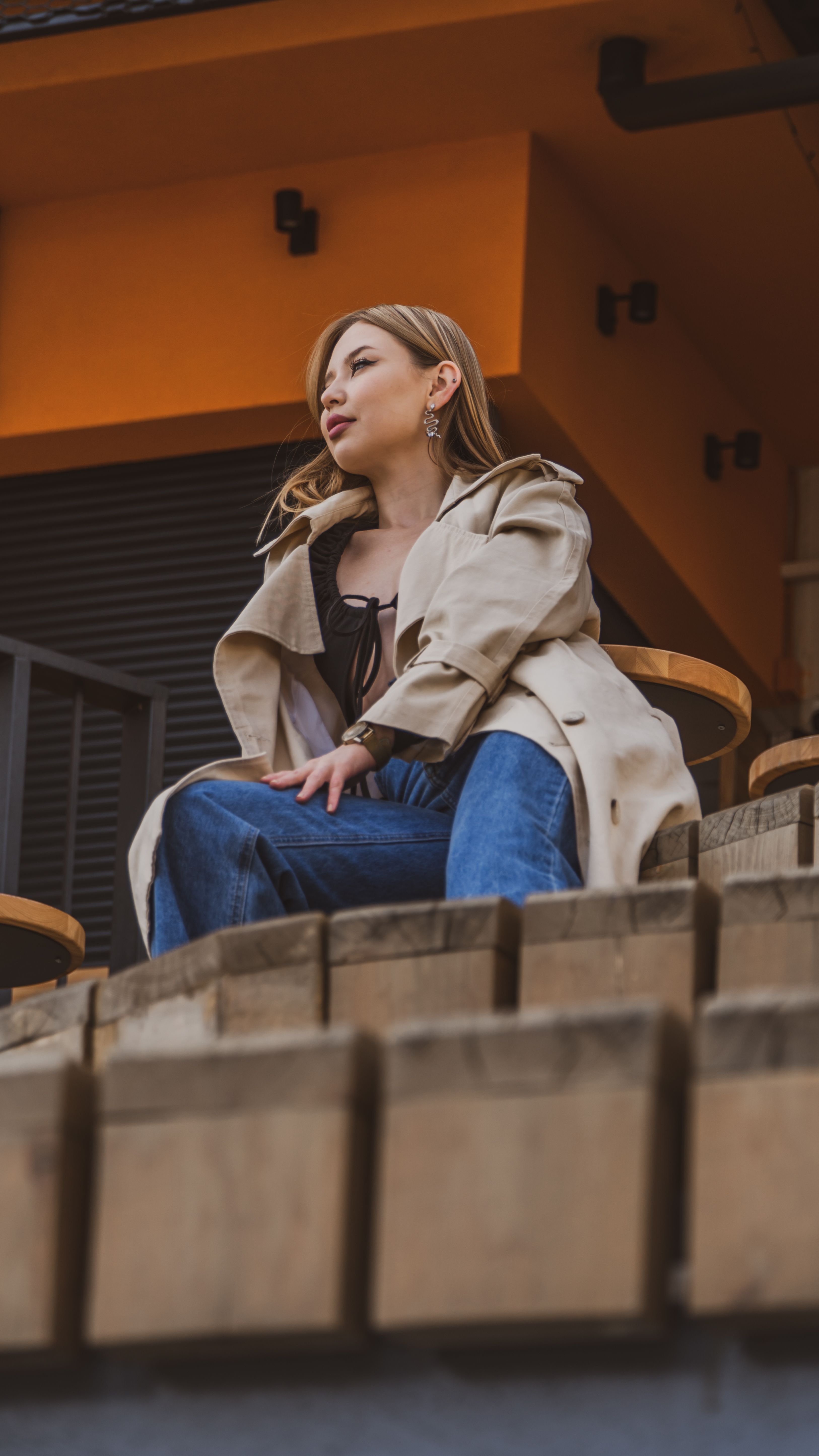 Low Angle Shot of a Woman Wearing Coat · Free Stock Photo