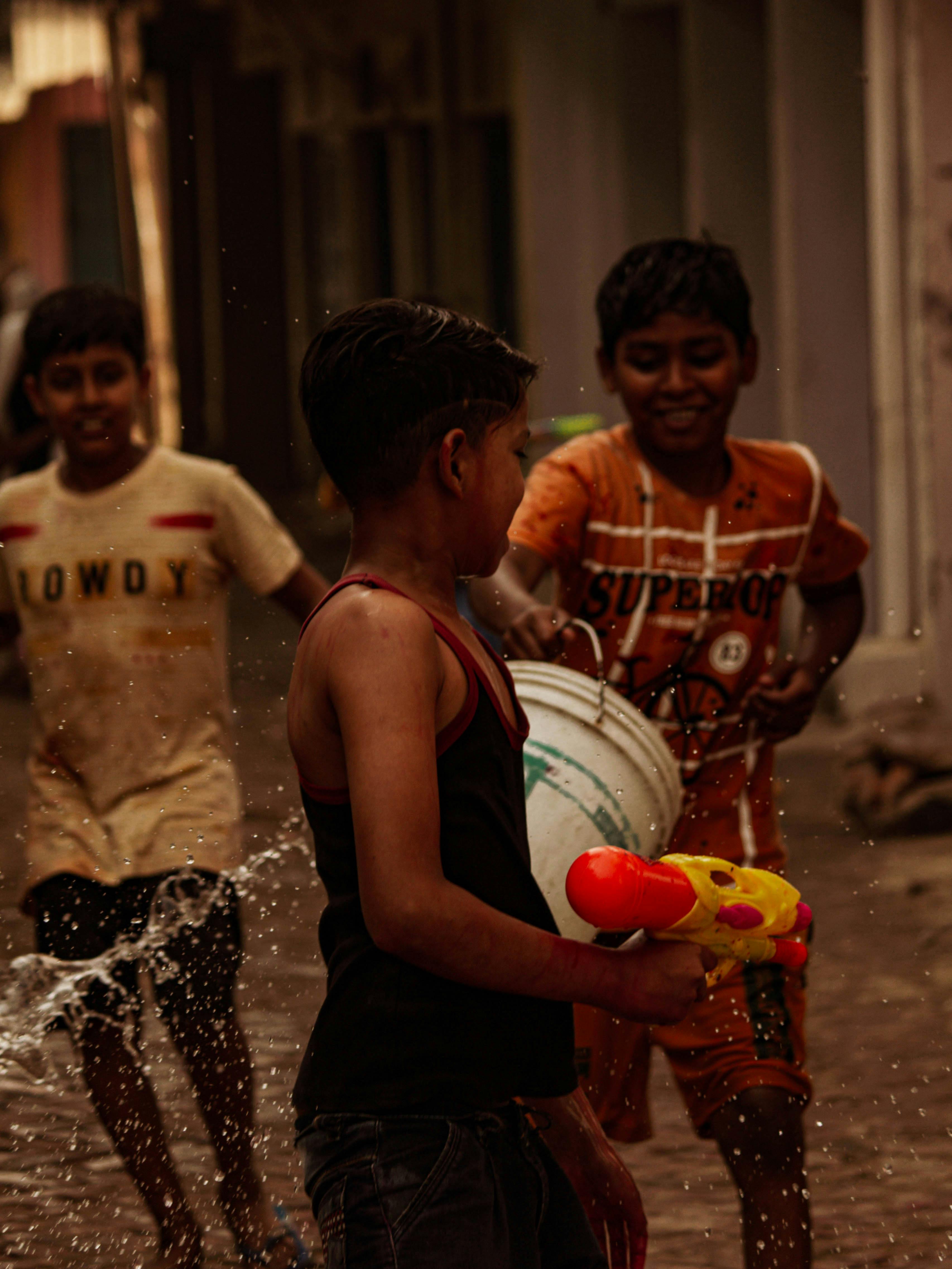 Kids Playing with Water Together · Free Stock Photo
