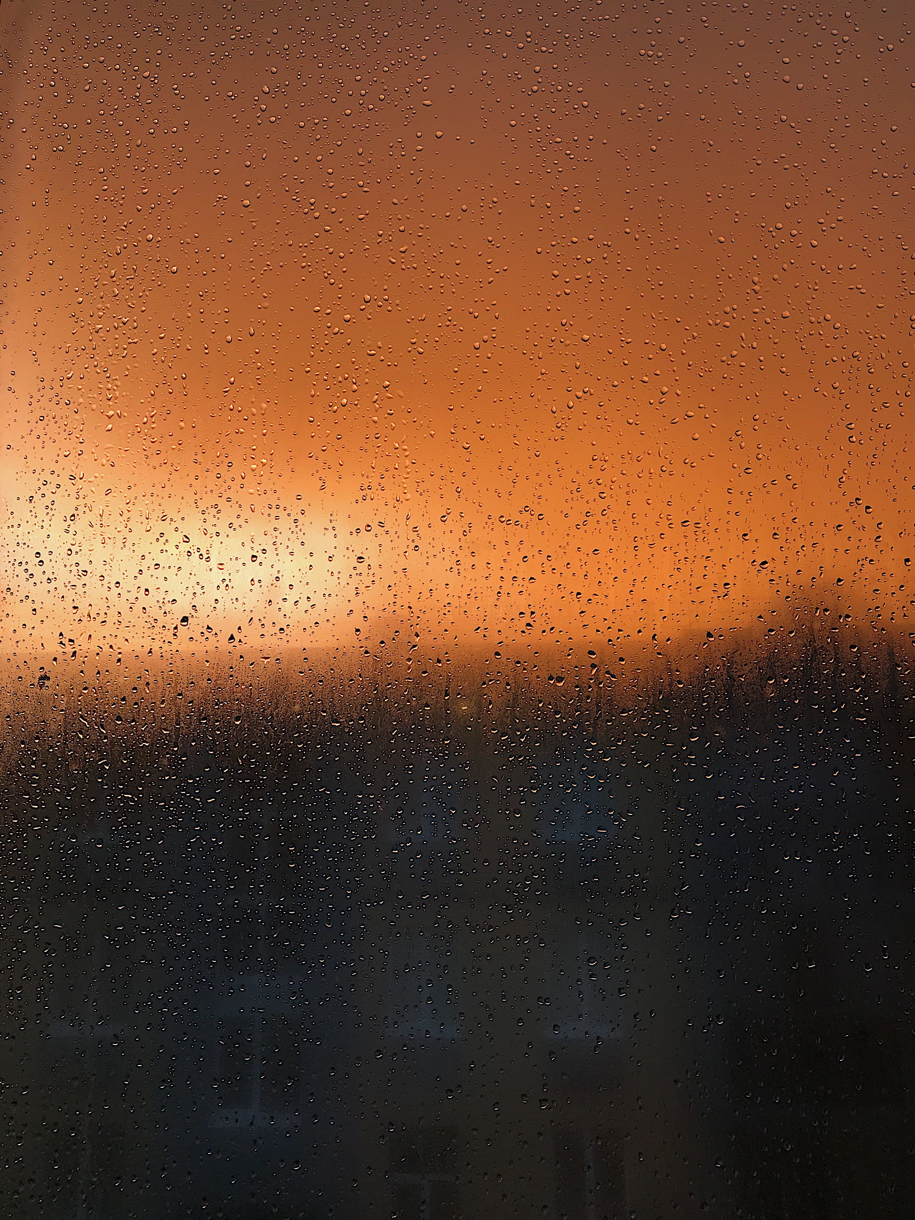 A Wet Window with Sunset View · Free Stock Photo