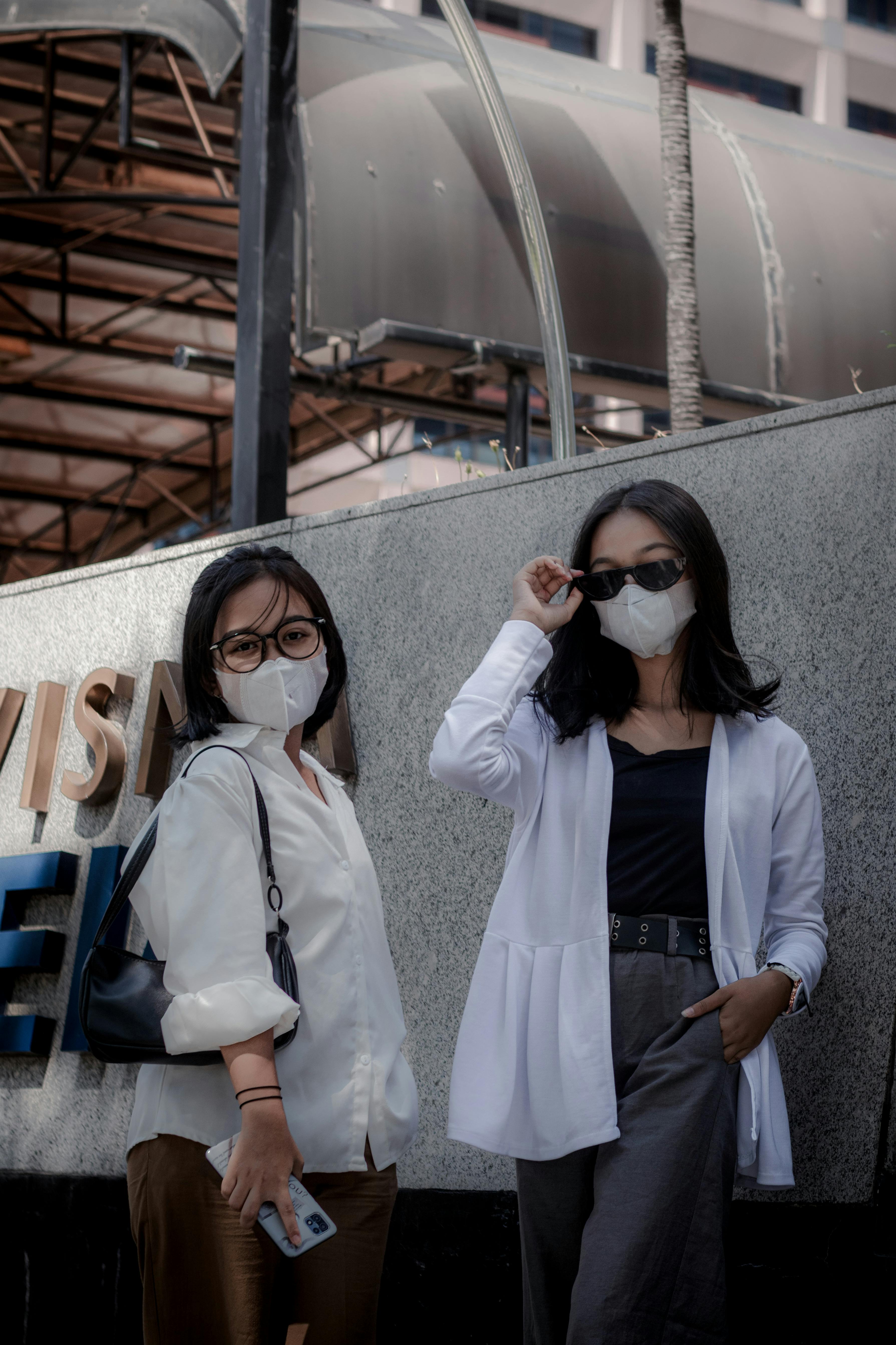Low-Angle Shot of a Woman Wearing Sunglasses · Free Stock Photo