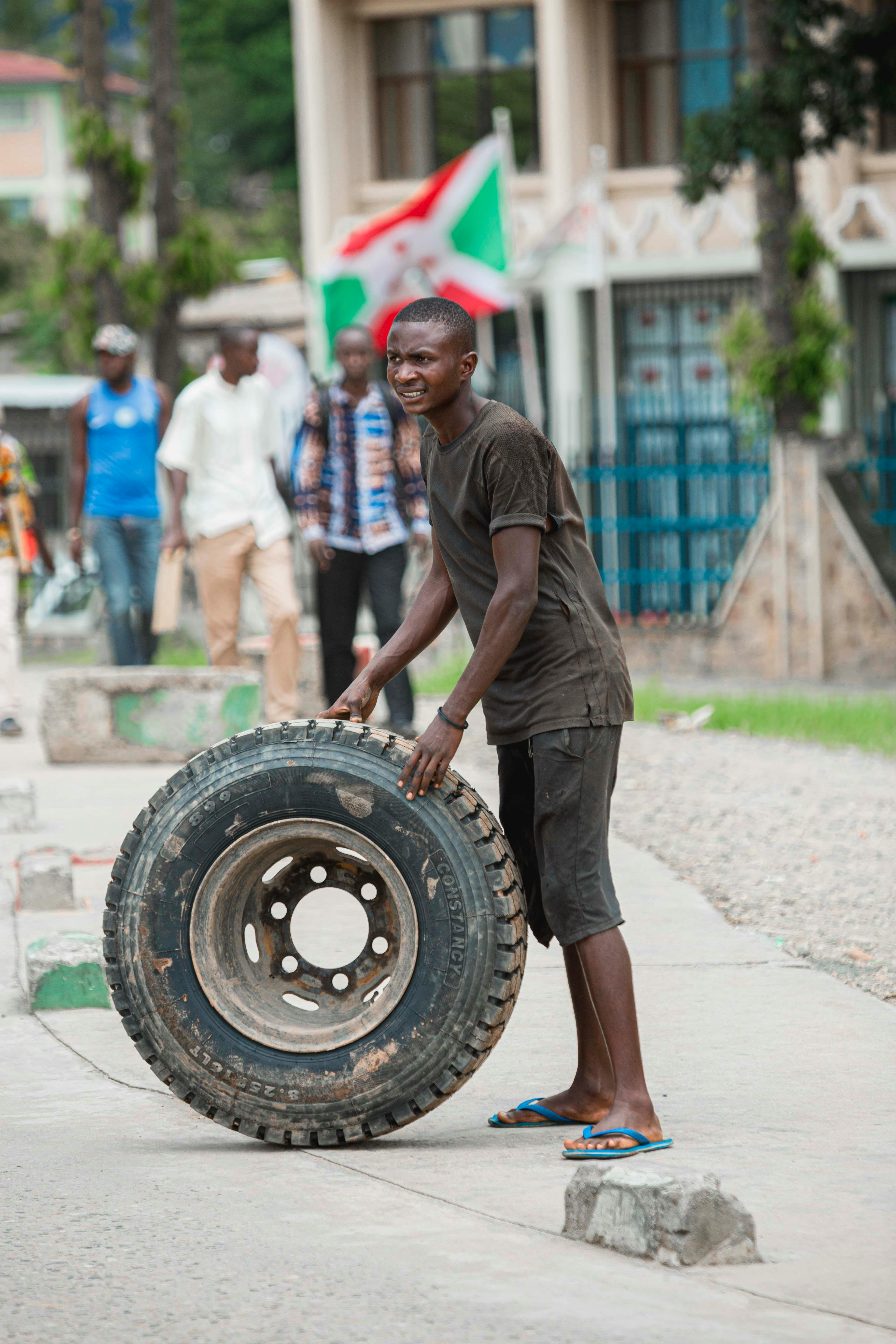 Man Pouring Liquid to Bottles · Free Stock Photo