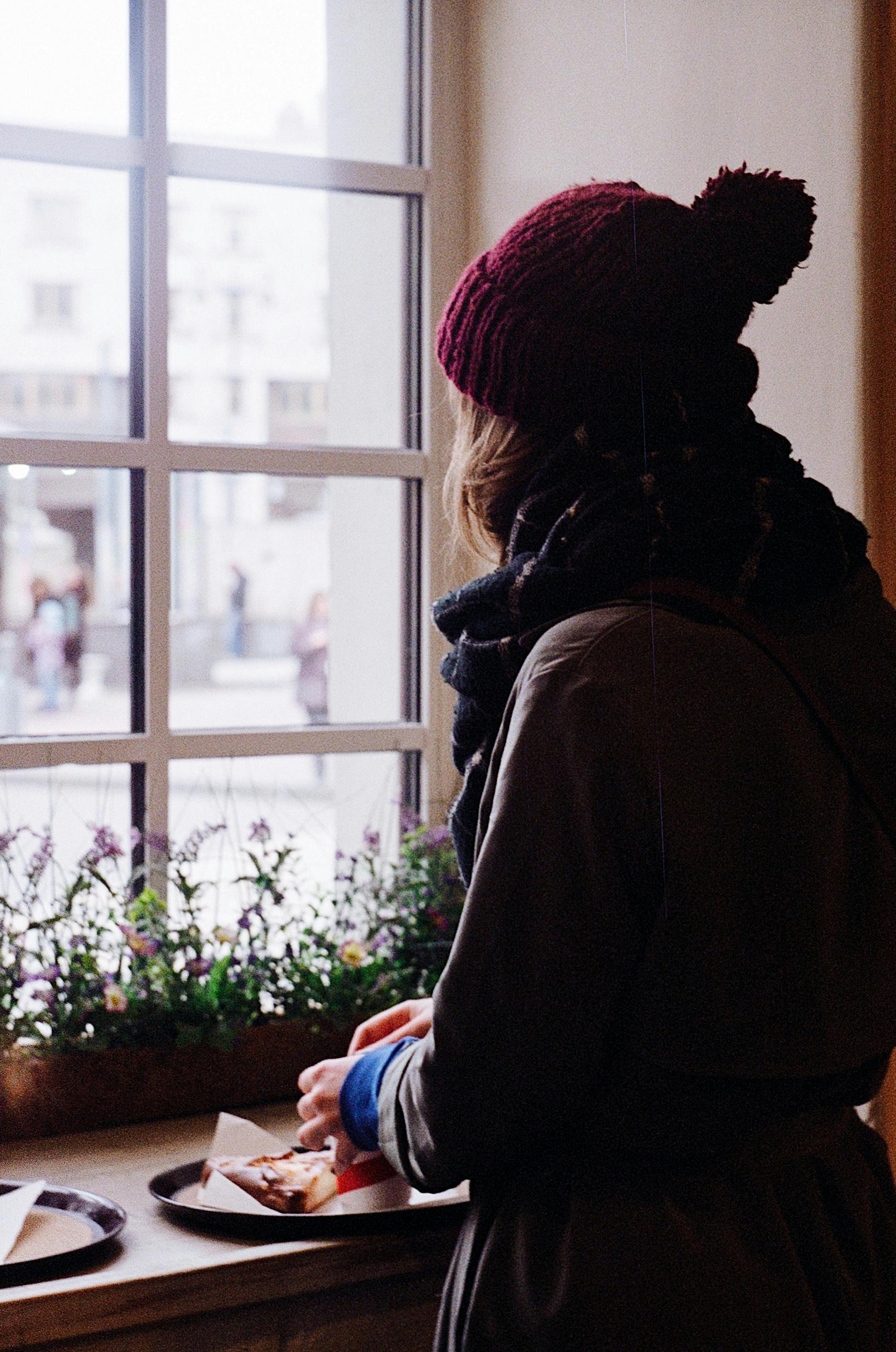 A Person Standing Near Window · Free Stock Photo