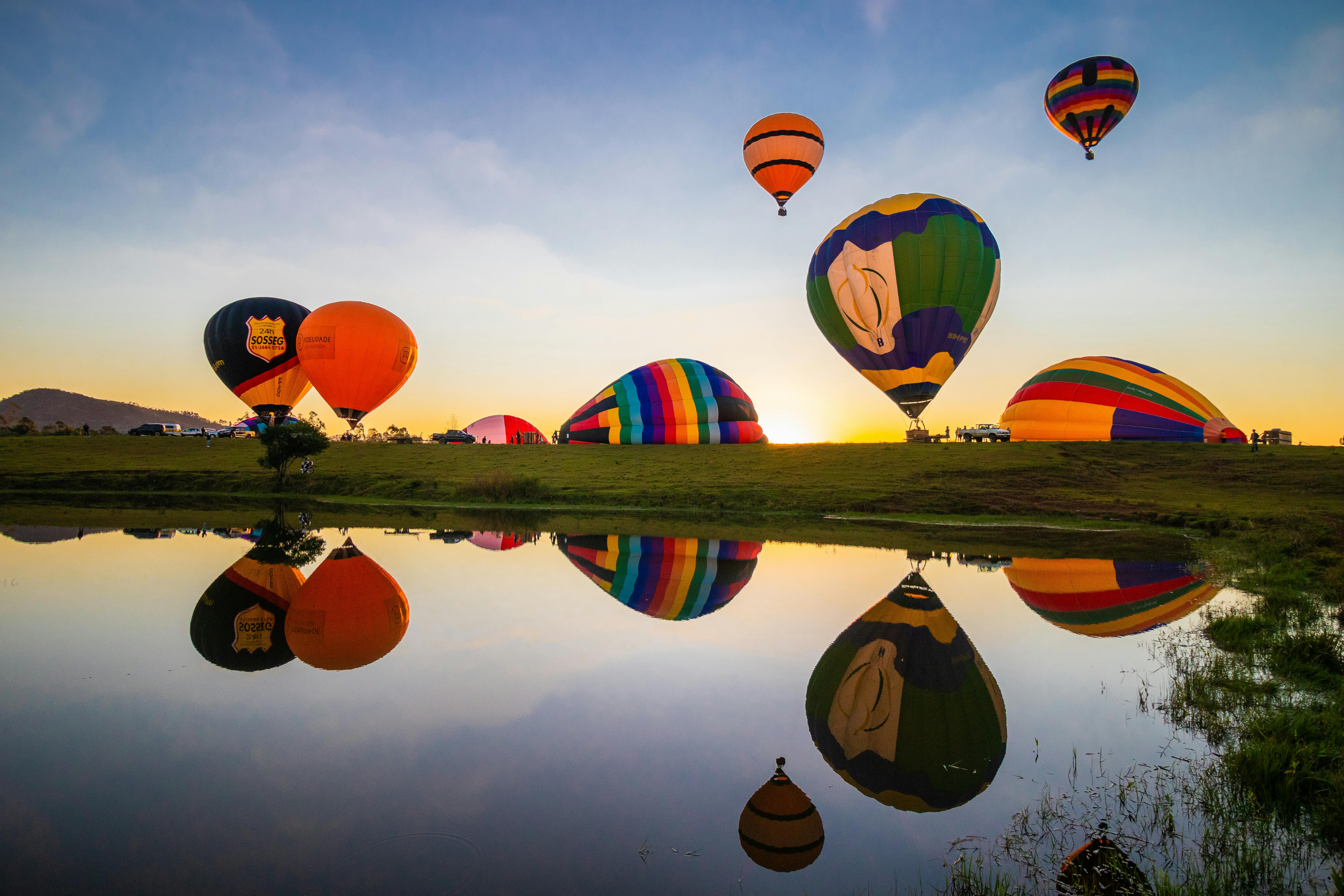 Balloons Reflection in Water at Sunset · Free Stock Photo