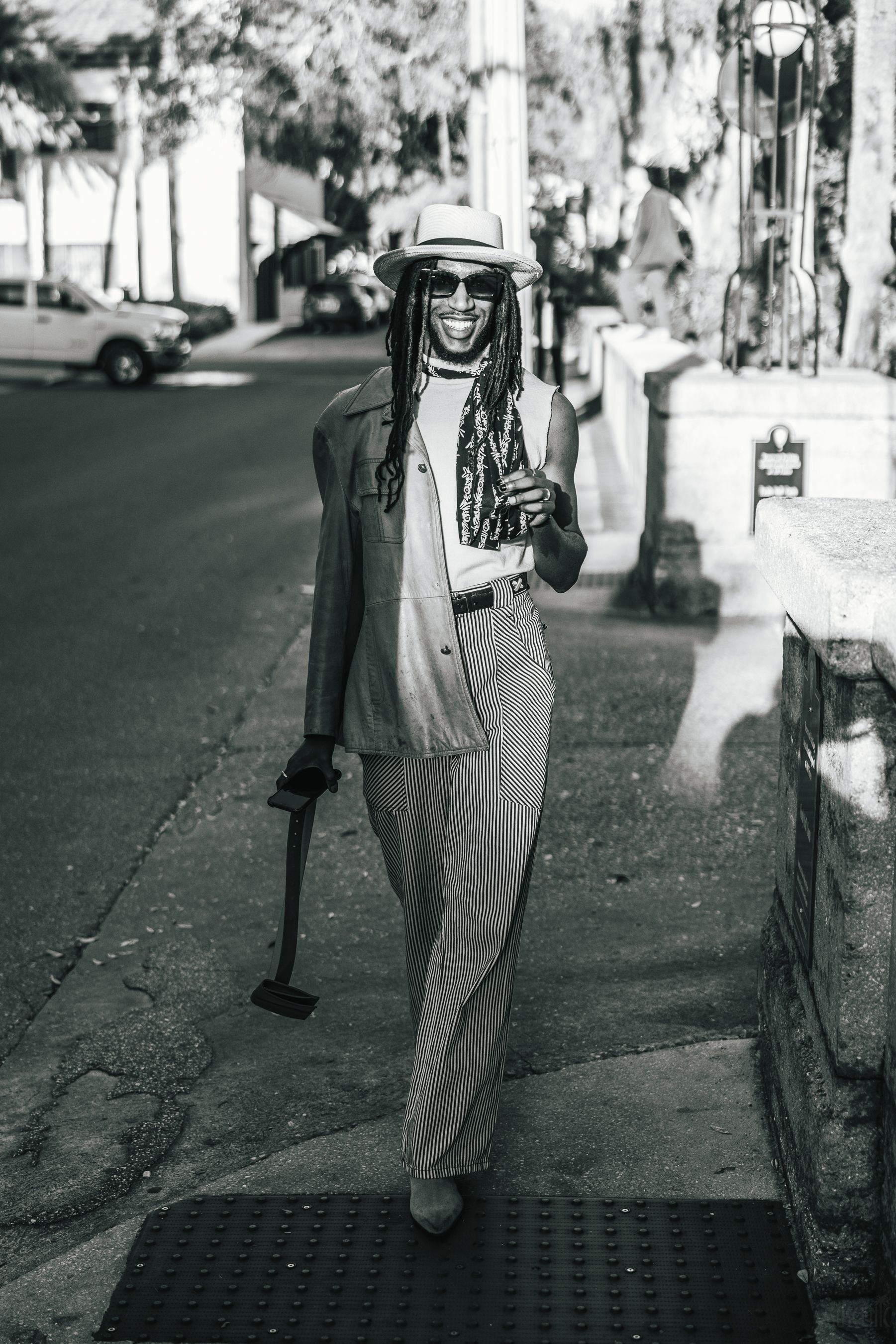 Stylish Woman Walking on Sidewalk · Free Stock Photo