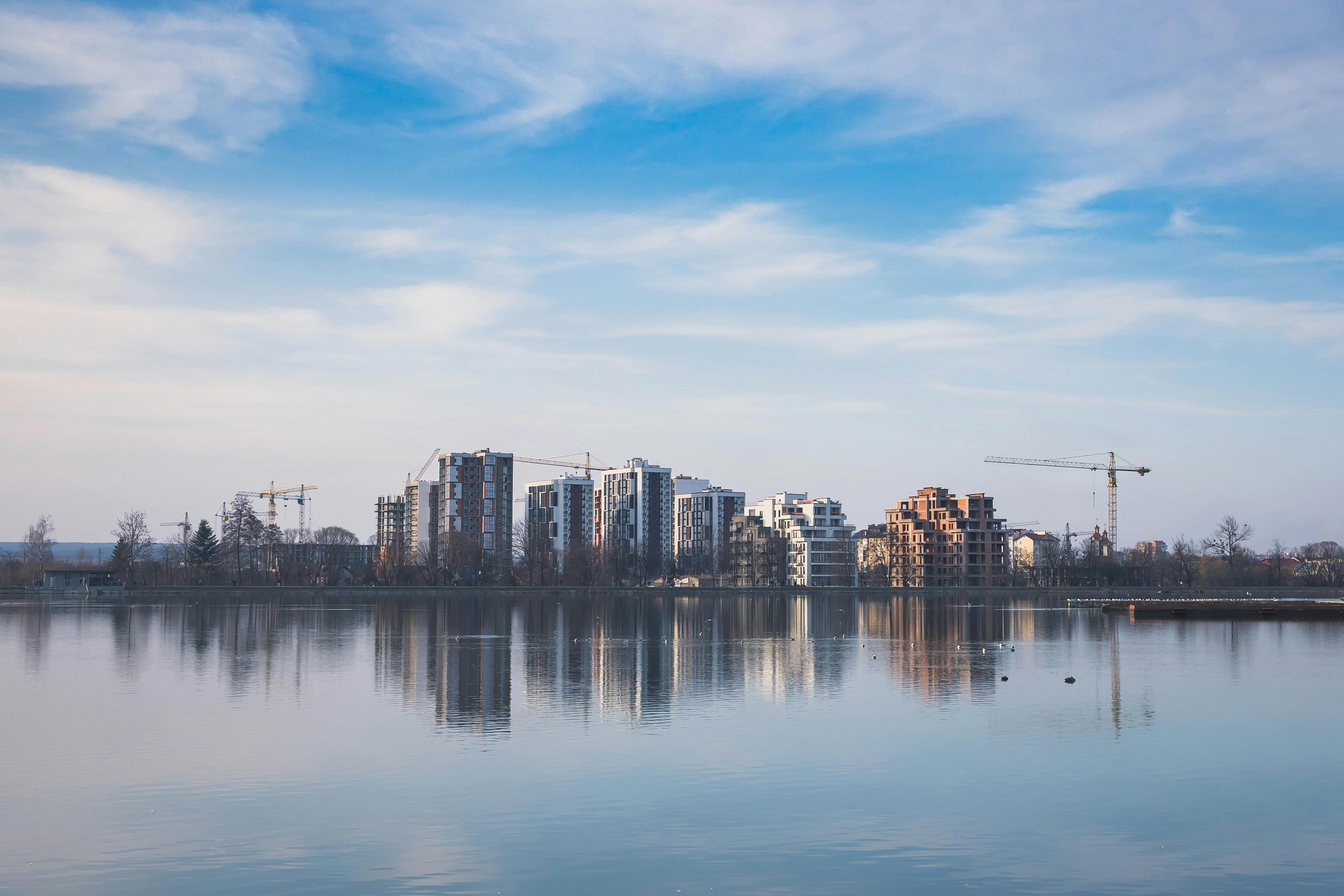 Clear Sky over Buildings in Town · Free Stock Photo