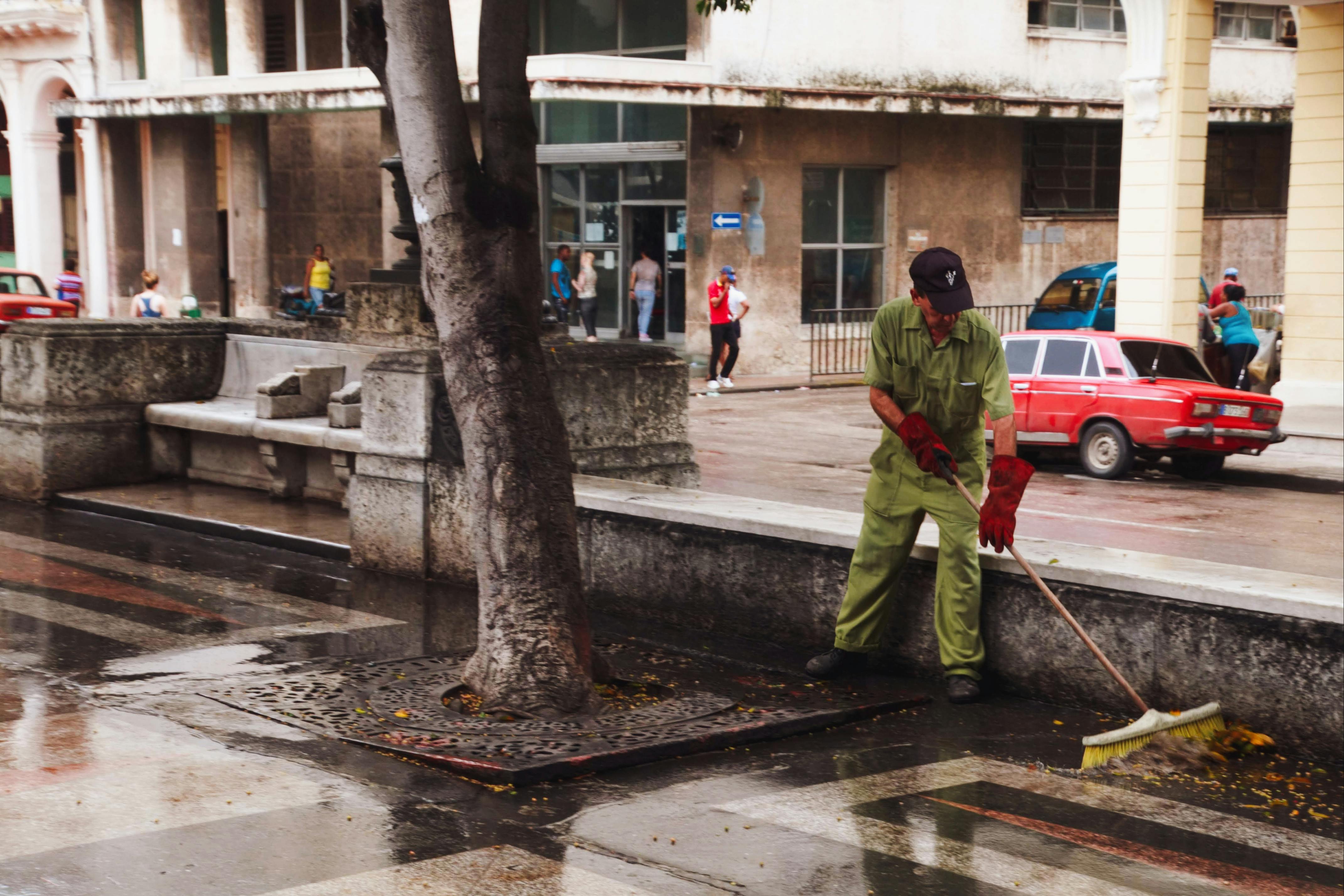 Man Sweeping Streets · Free Stock Photo