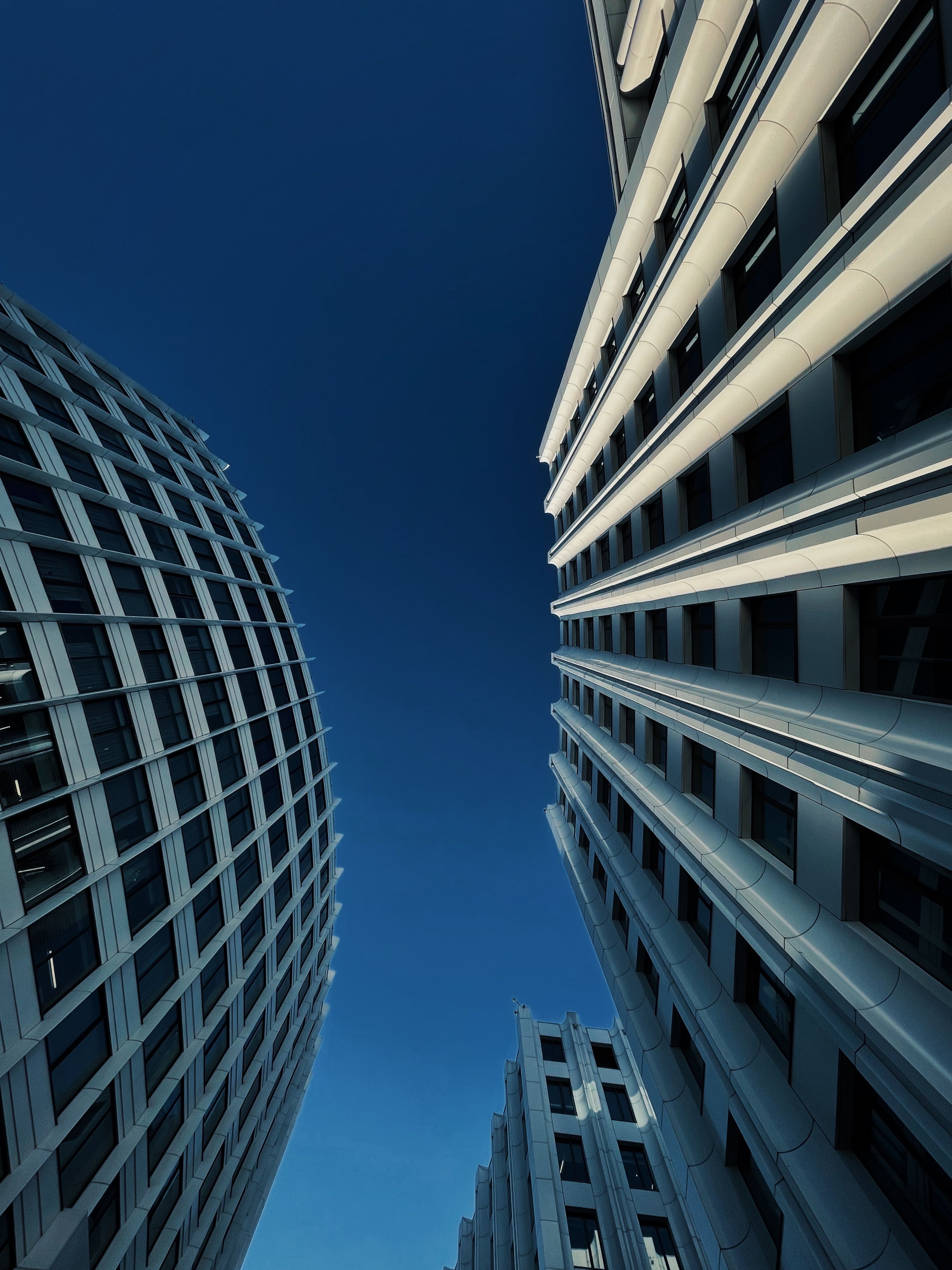 Gray Concrete Buildings Under Blue Sky · Free Stock Photo