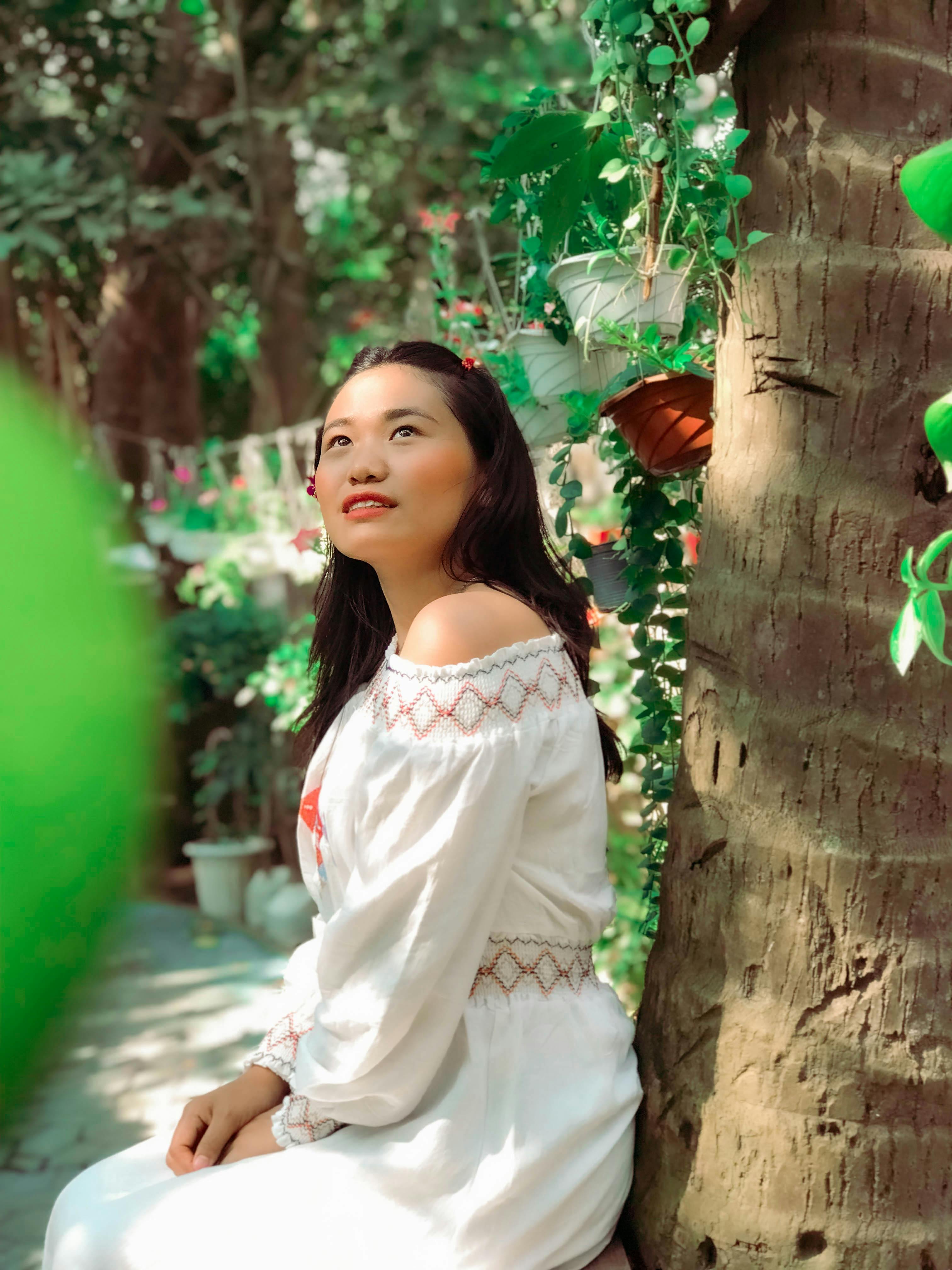 A Woman Standing under the Tree · Free Stock Photo
