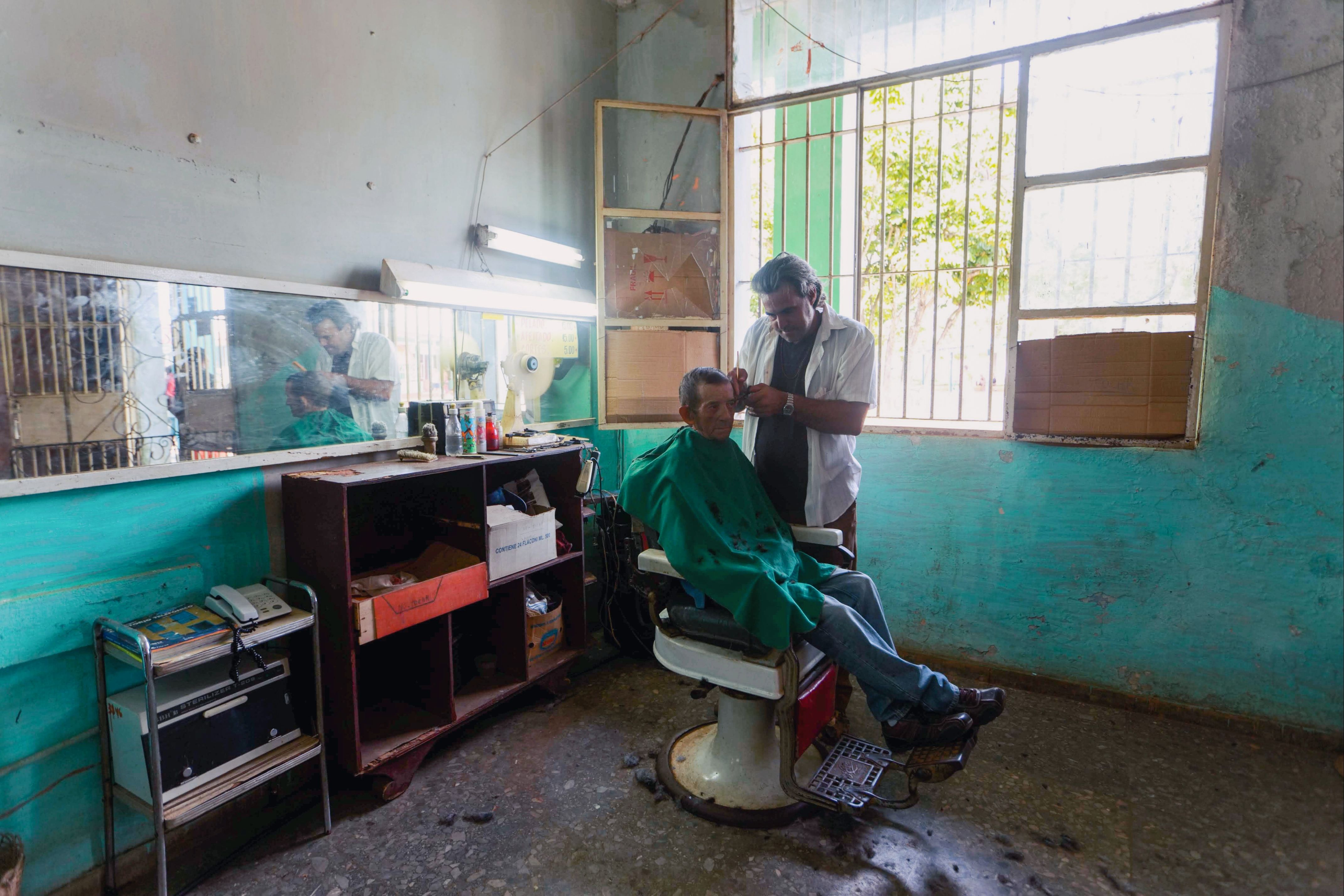 Profile of a Man at a Barber · Free Stock Photo