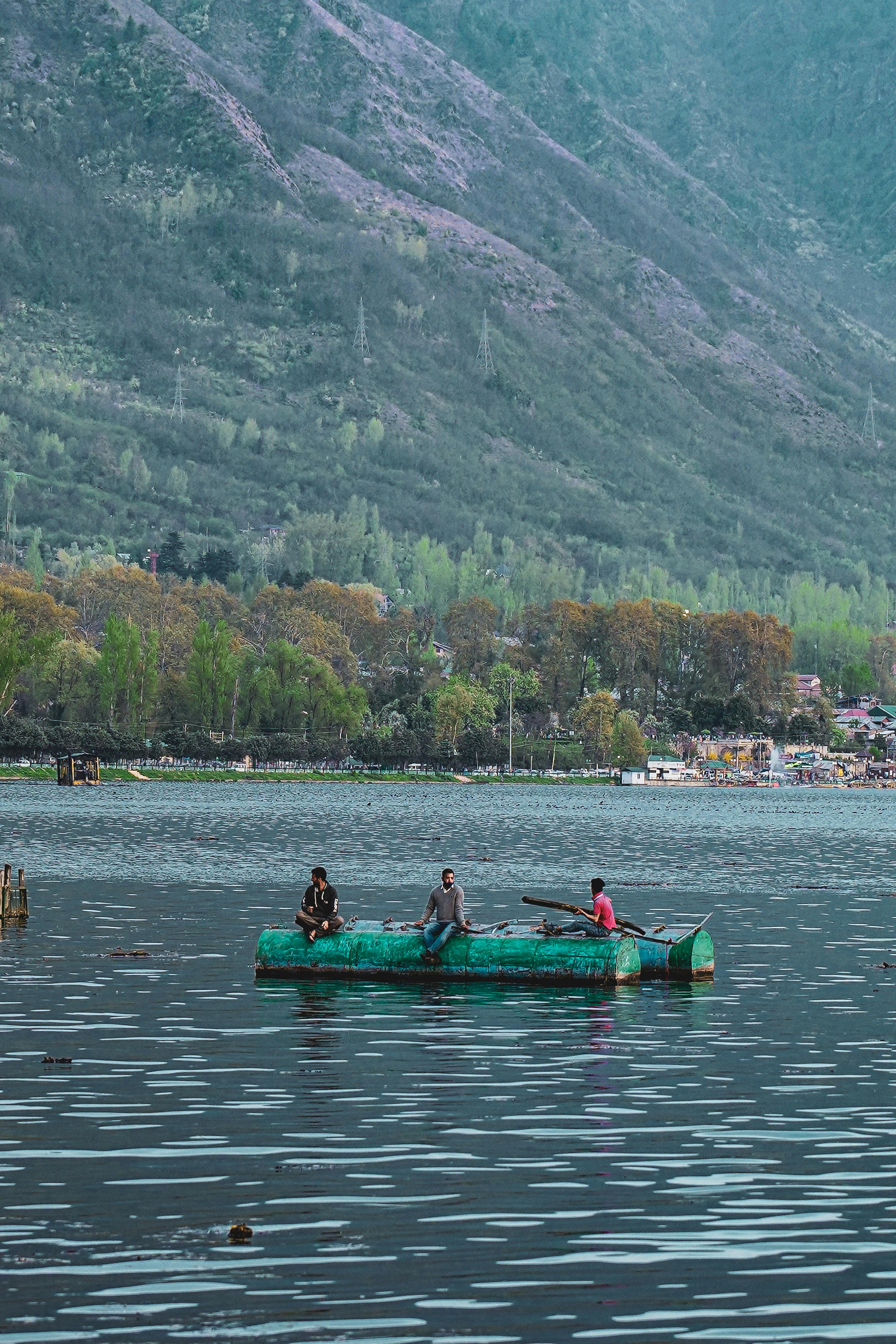 People on Raft on Lake · Free Stock Photo