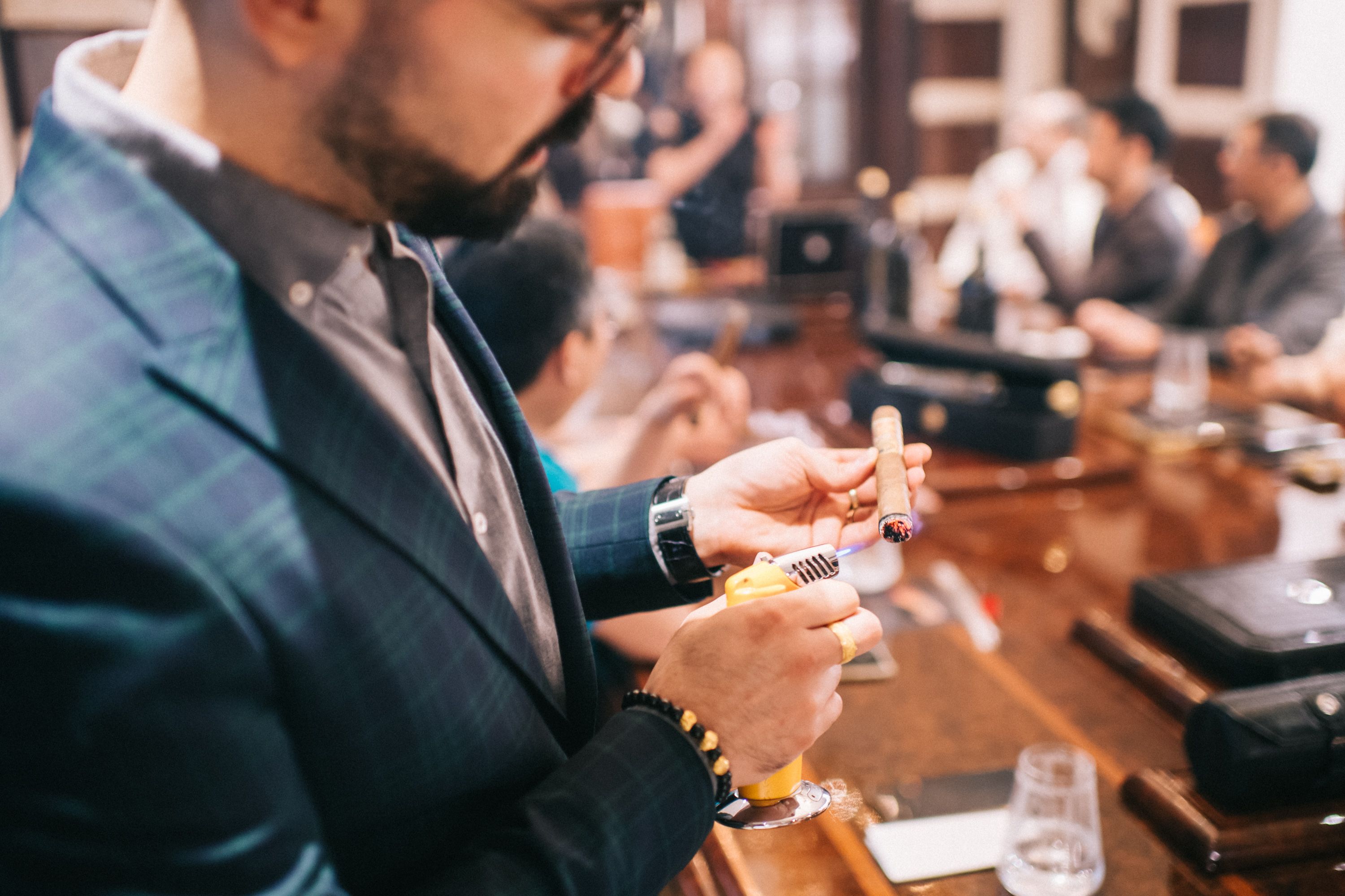 Man Lighting up a Cigar · Free Stock Photo