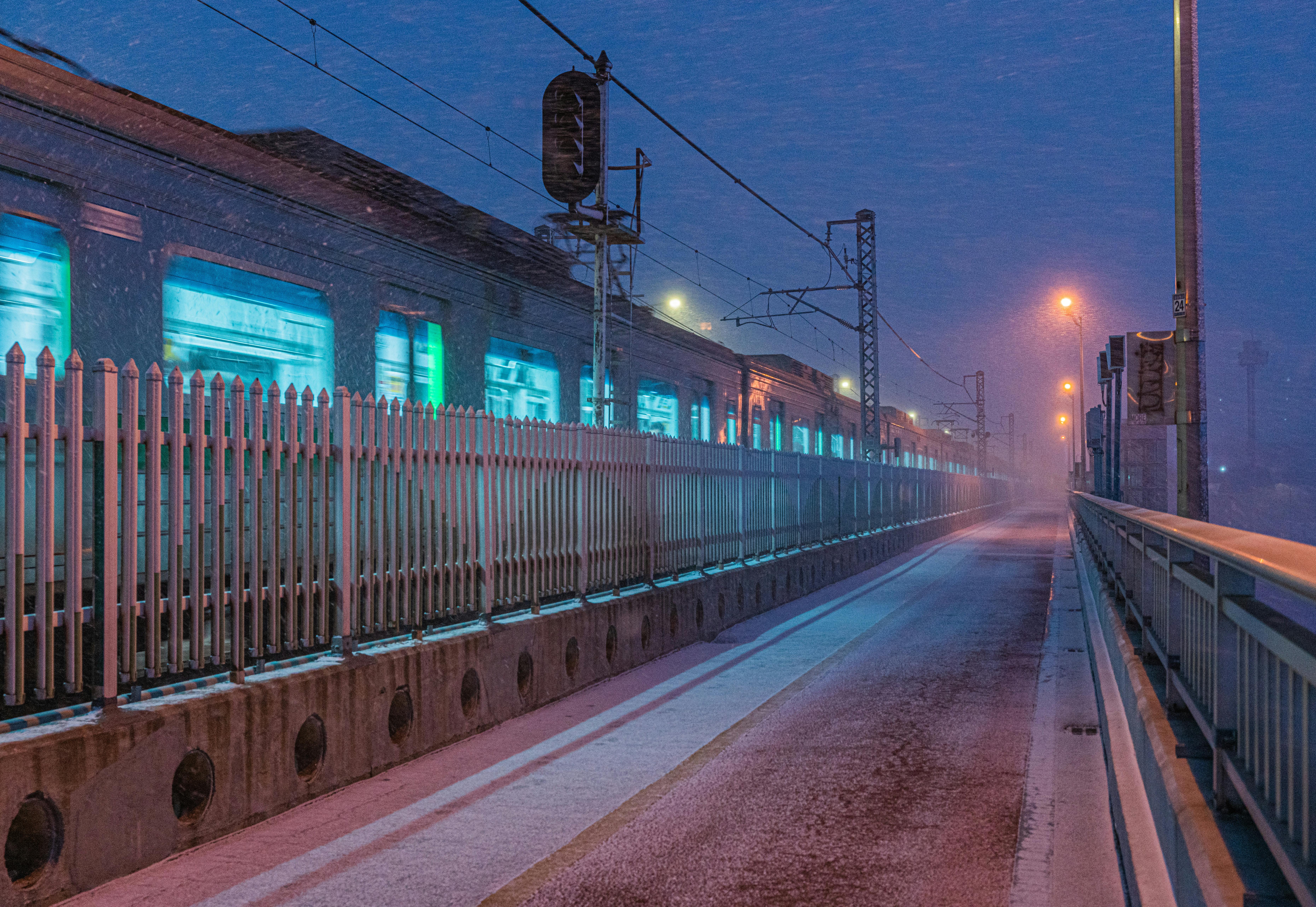 Train on Bridge in Snowy Winter · Free Stock Photo