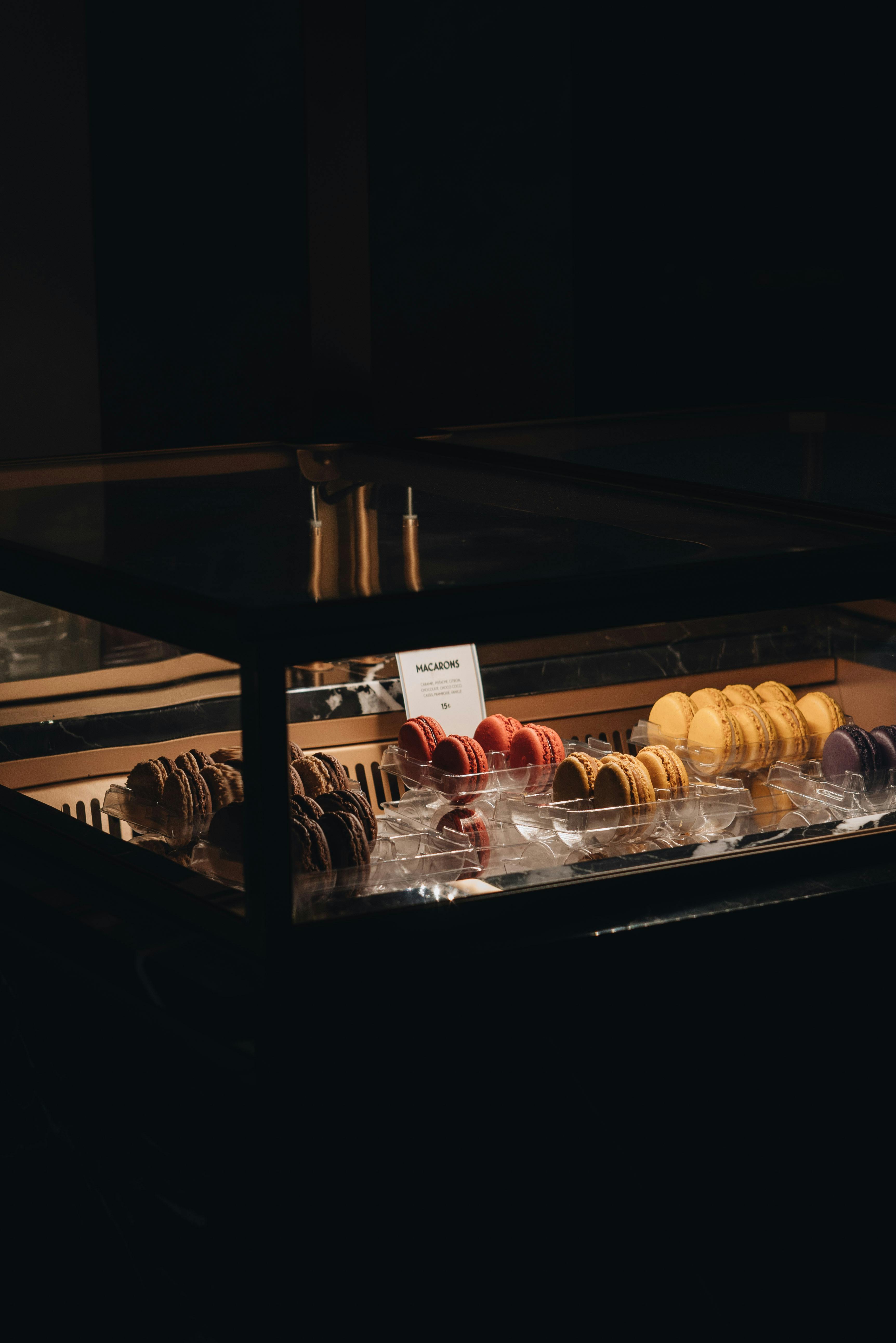 Assorted Pastries on Display Counter · Free Stock Photo