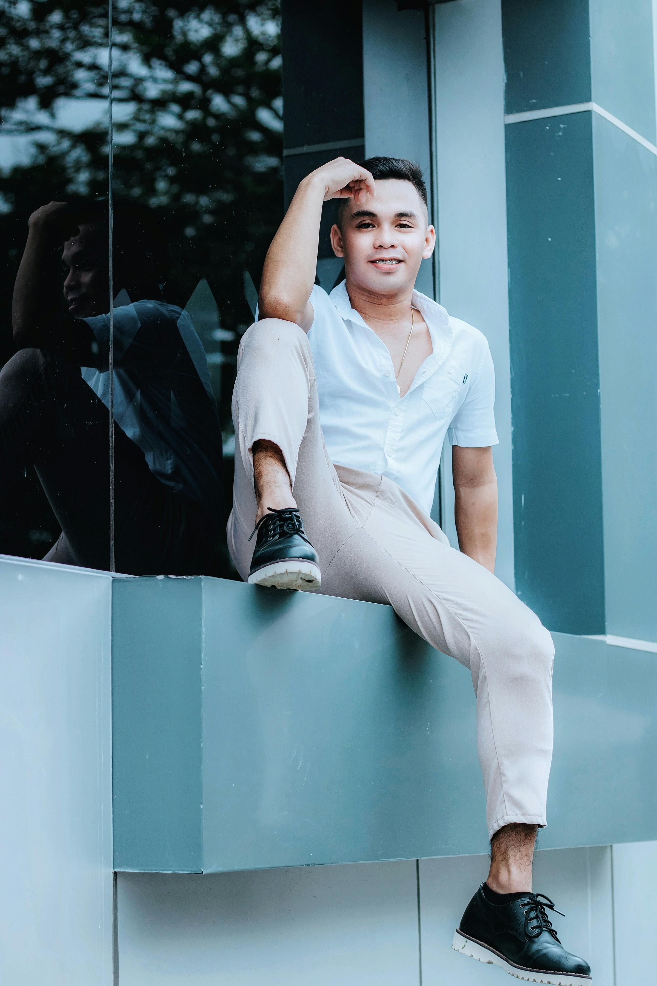 Man Posing by the Window · Free Stock Photo