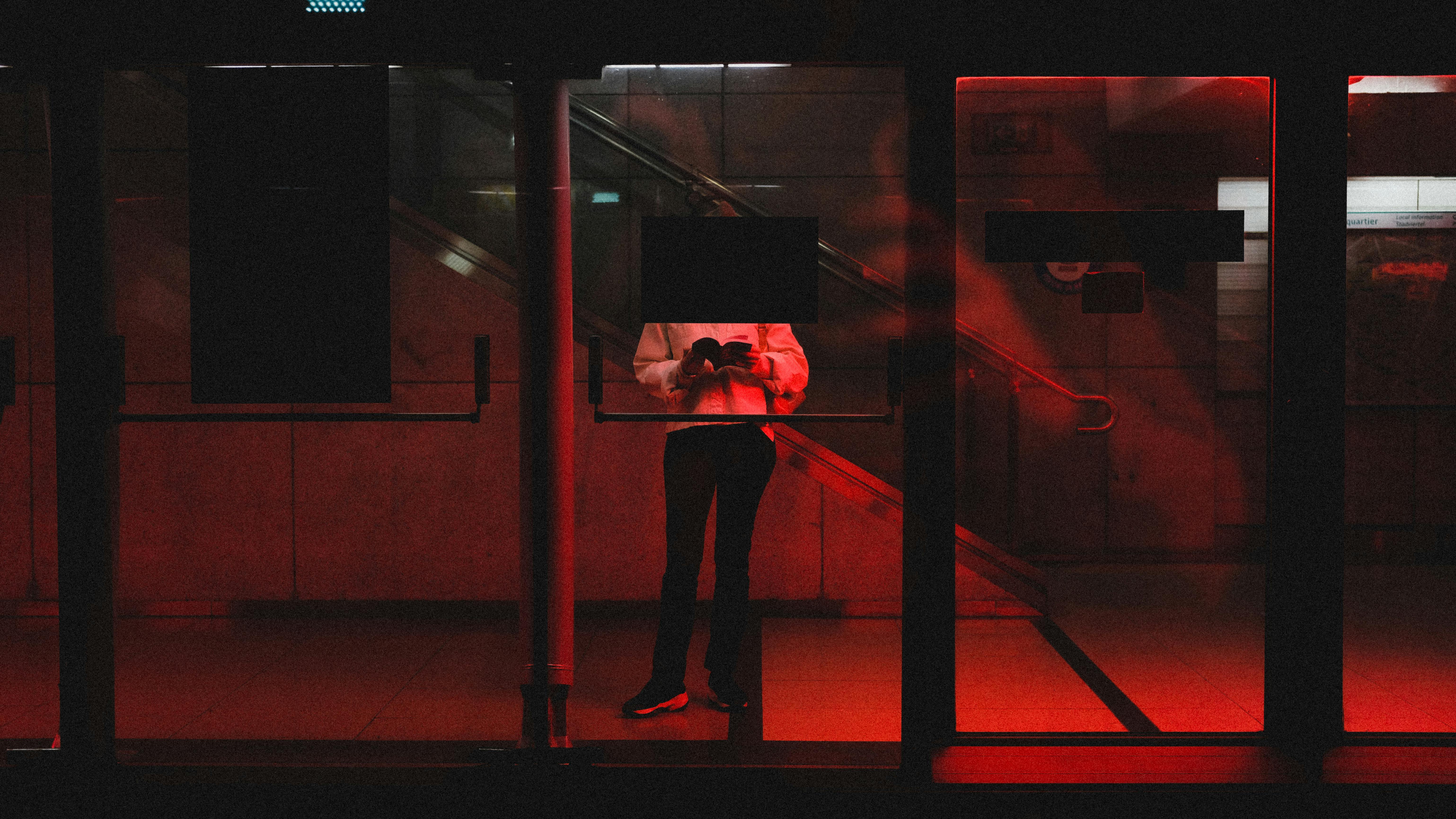 Person in Red Light on Street · Free Stock Photo
