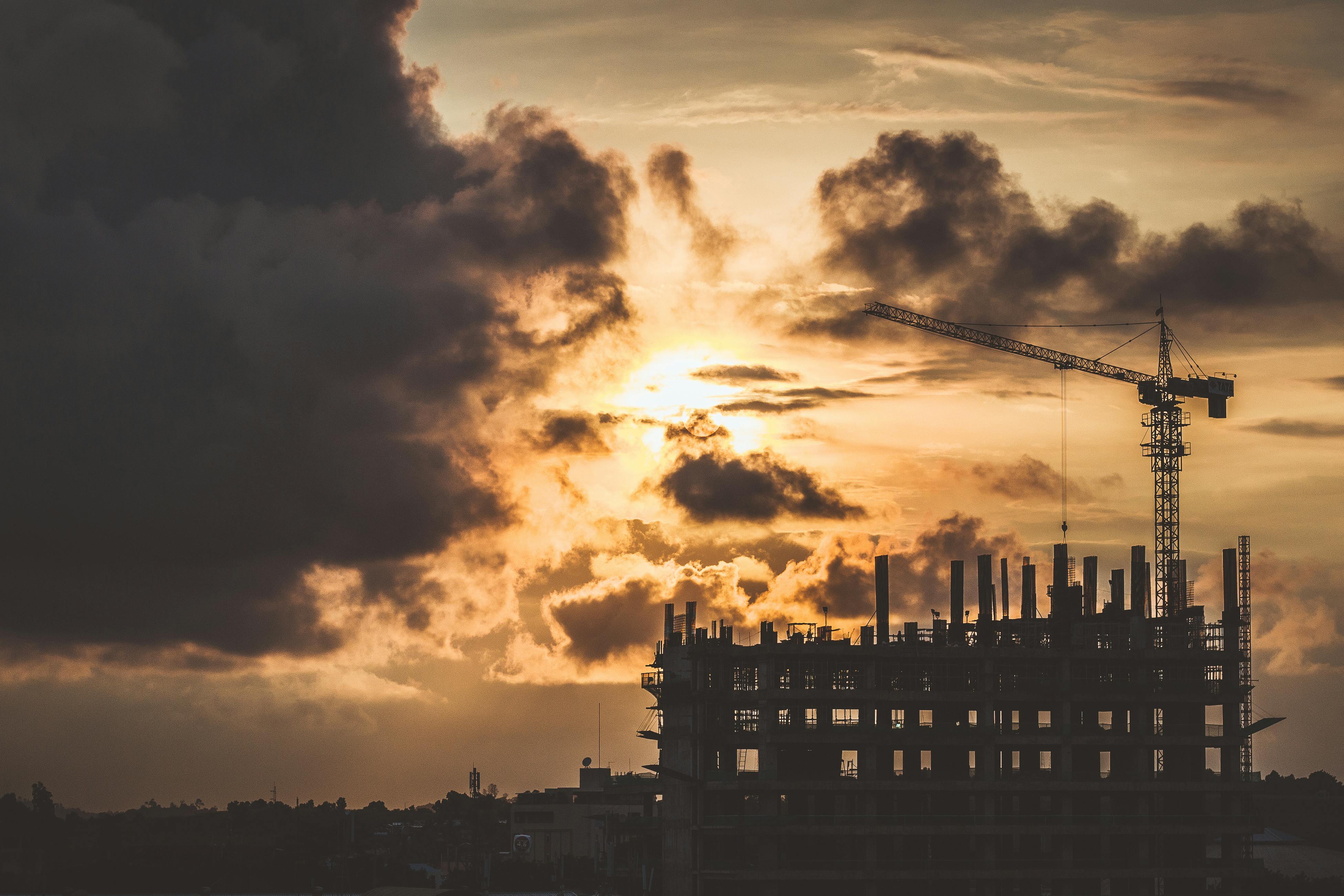 Silhouette of Unfinished Building During Golden Hour · Free Stock Photo