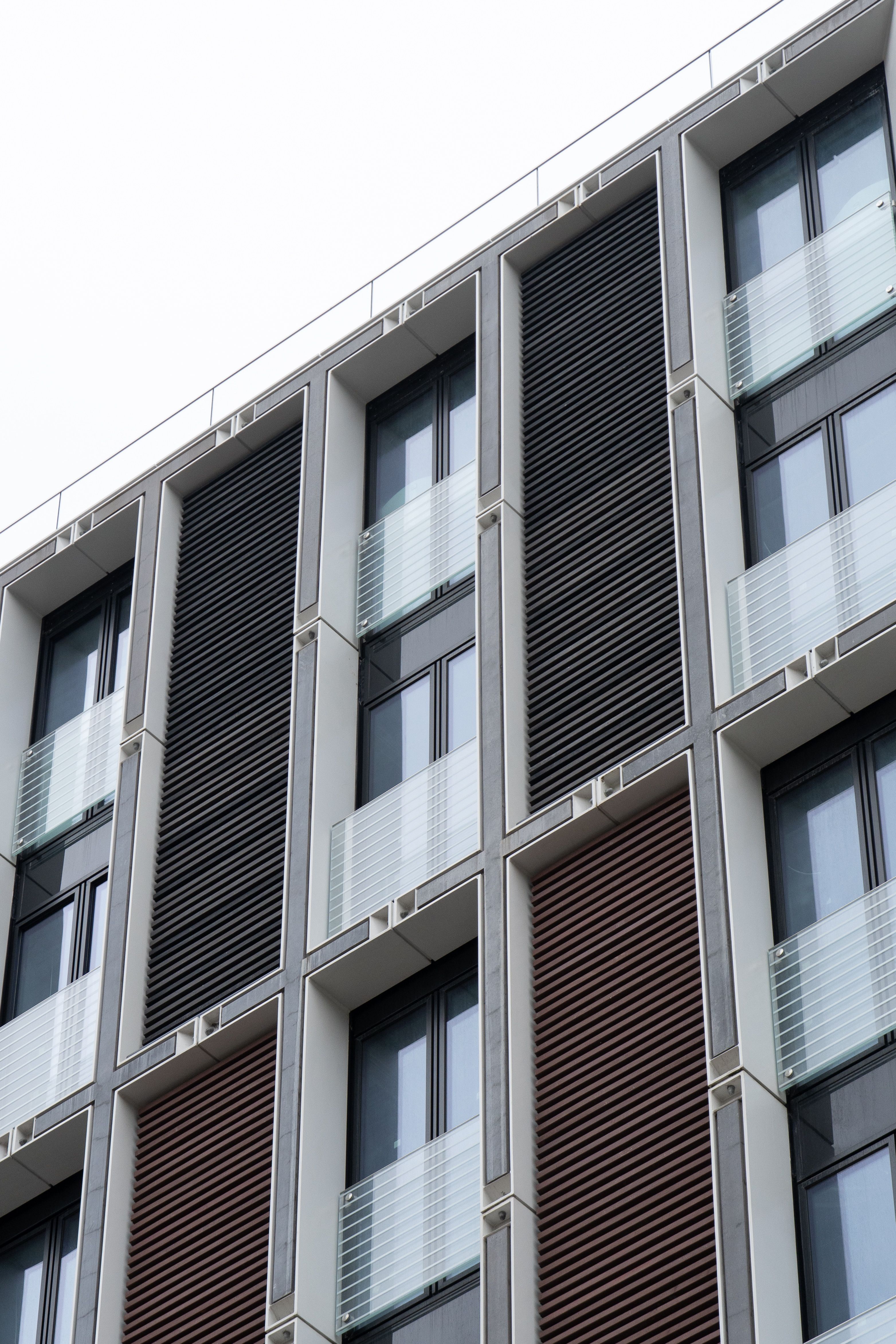 Modern Apartment Building on Sky Background · Free Stock Photo