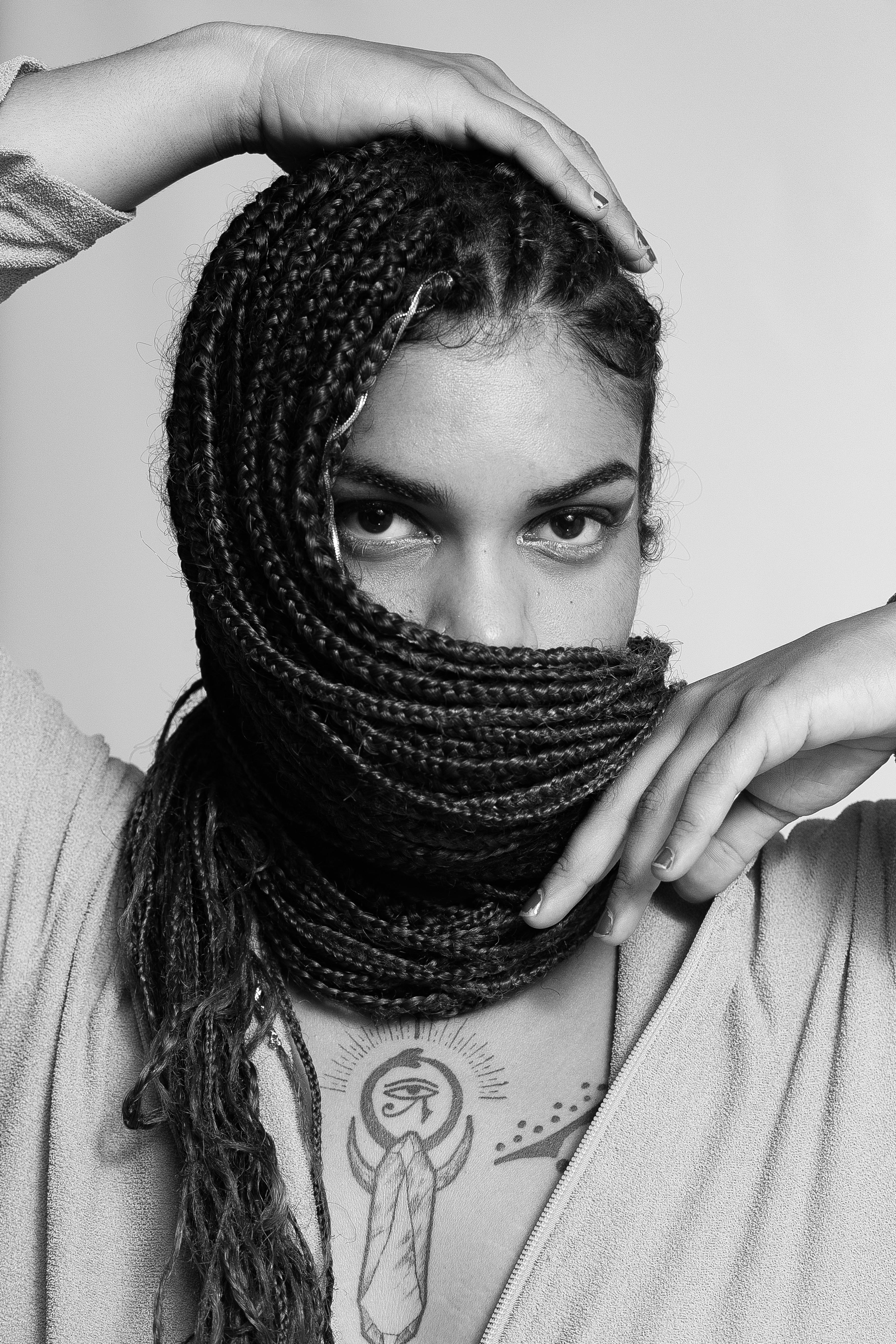 Grayscale Photo of a Woman Covering Face with Her Braided Hair · Free ...