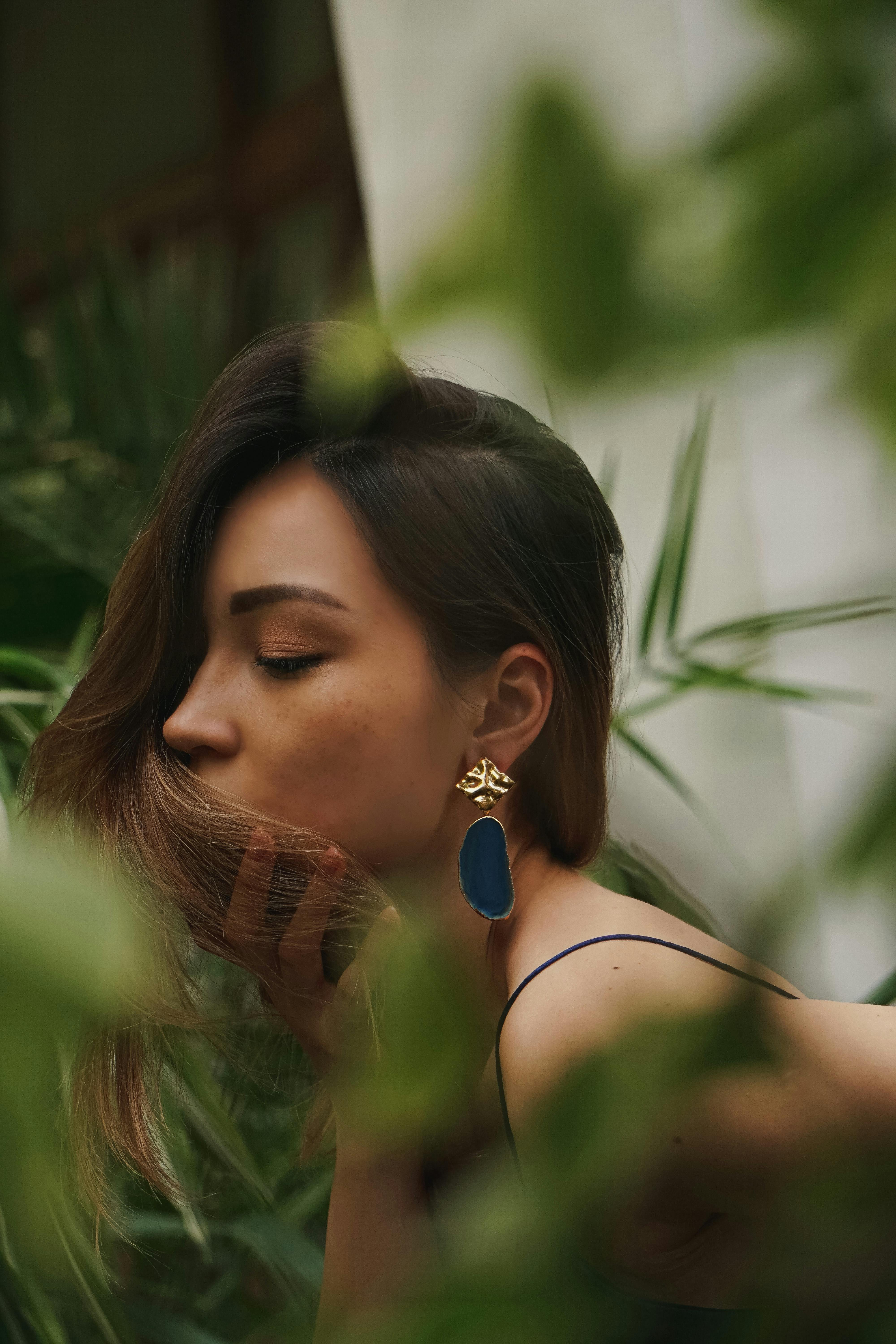 Woman Covering her Face with her Hair · Free Stock Photo