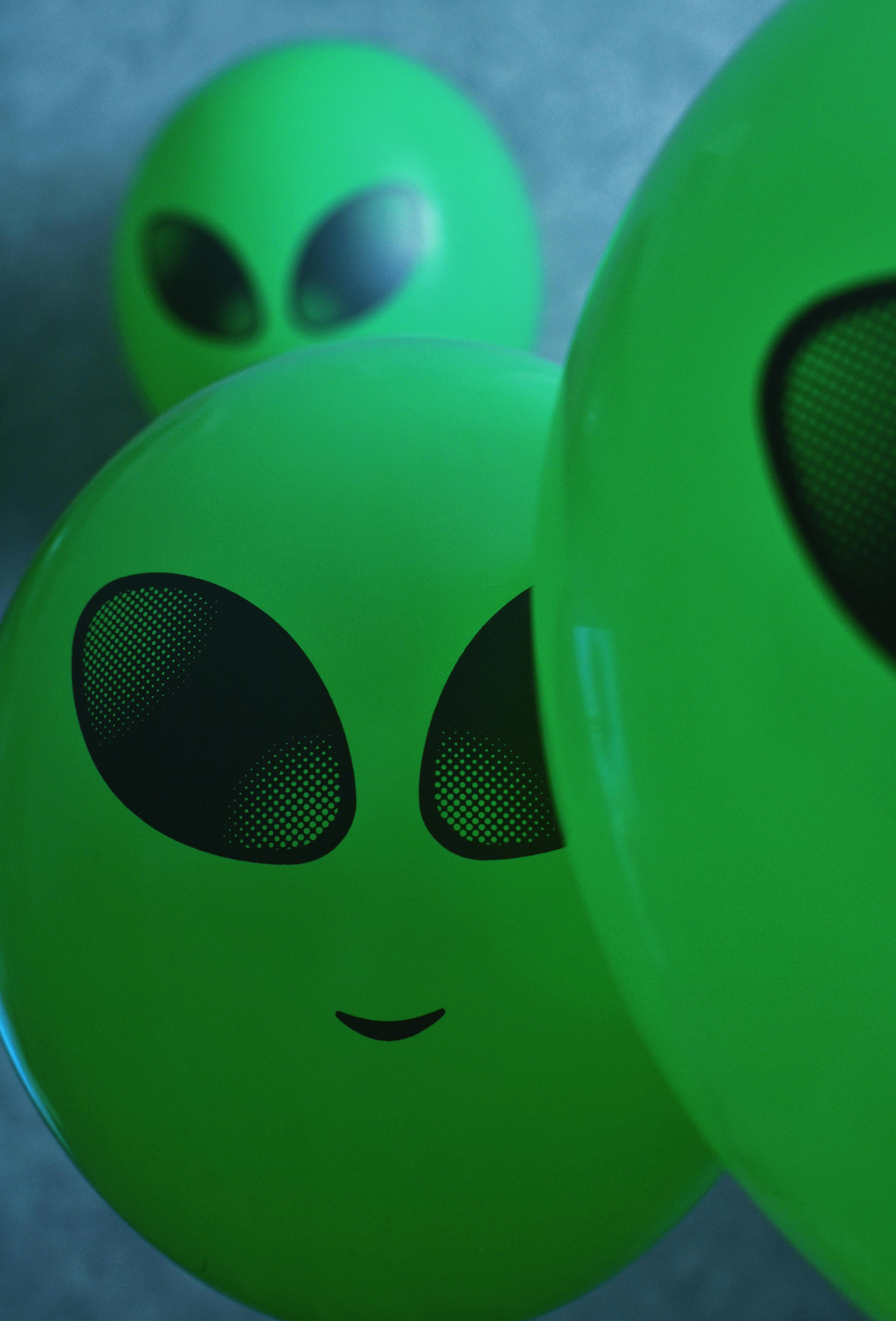 Green Balloons with Alien Faces · Free Stock Photo