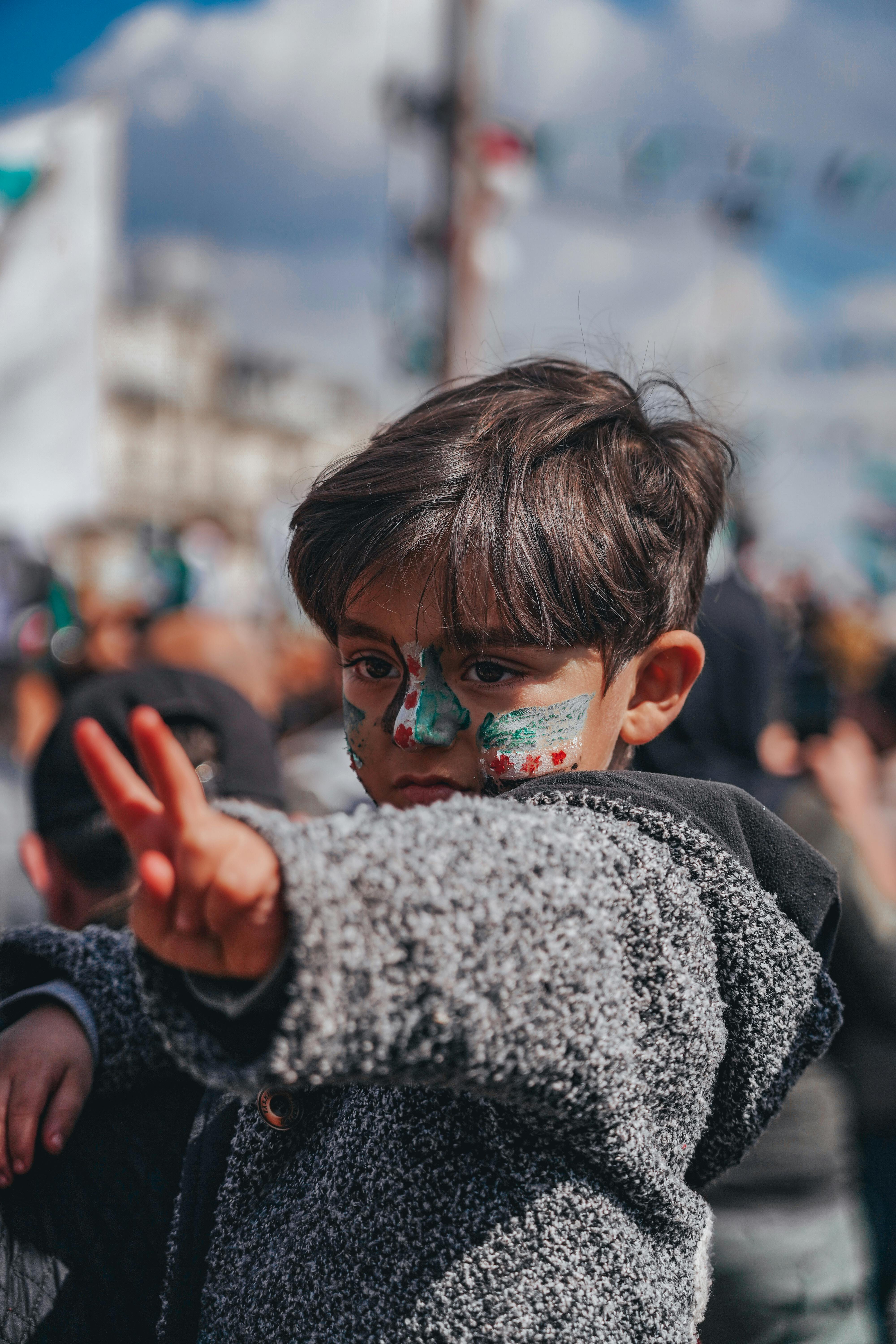 Boy Doing a Peace Sign · Free Stock Photo
