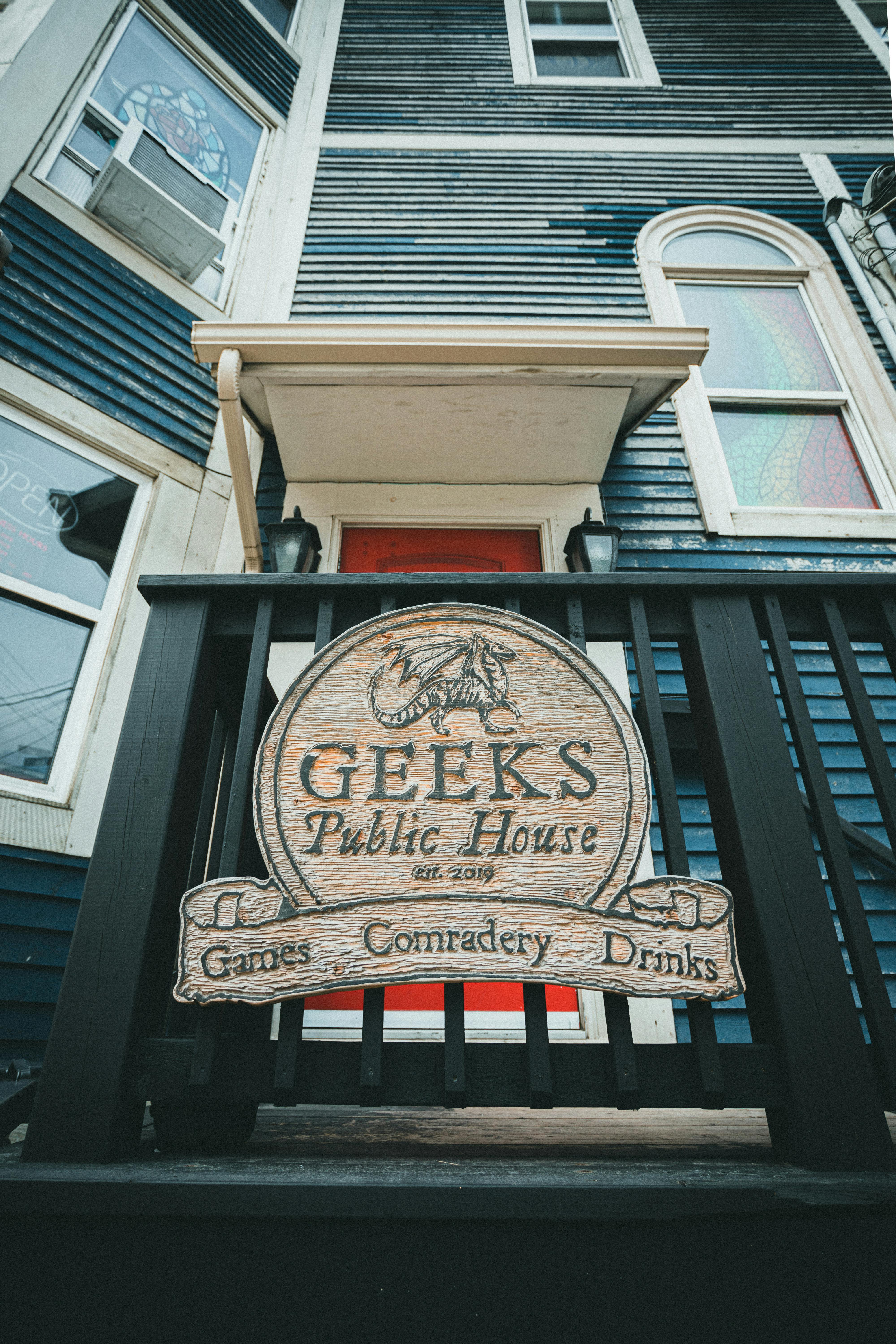 Wooden Sign of a Pub · Free Stock Photo